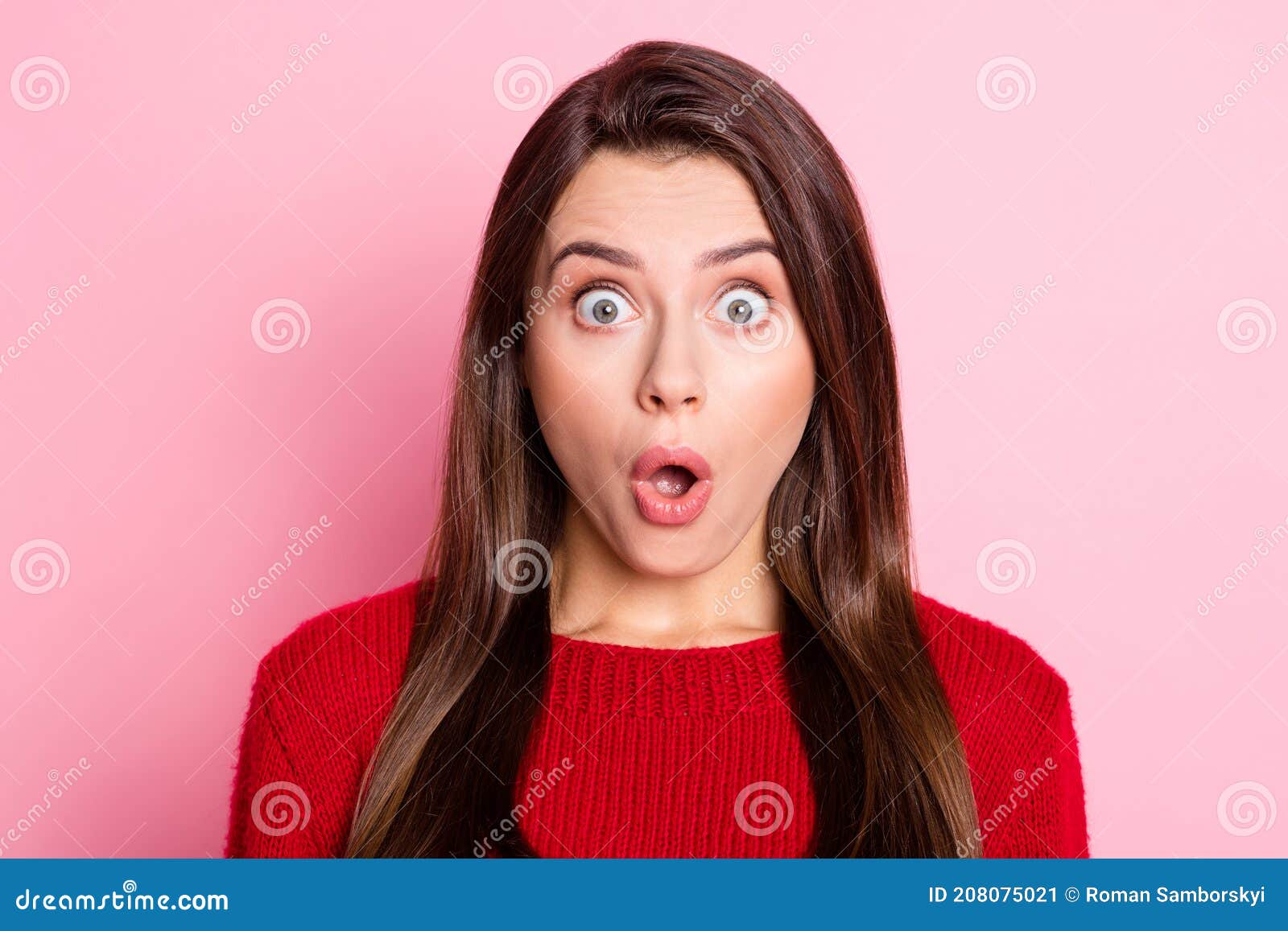 Portrait Photo Of Shocked Astonished Young Woman Starring With Opened