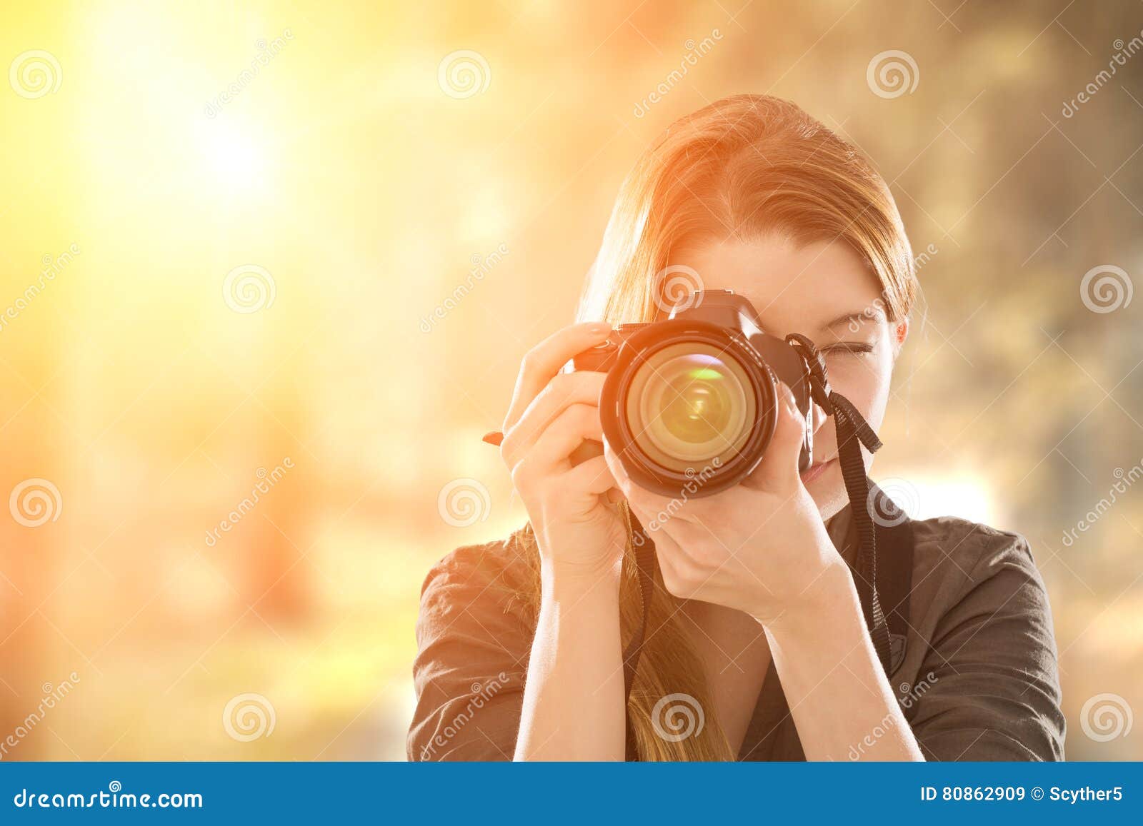 Portrait of a Photographer Covering Her Face with Camera. Stock Image ...