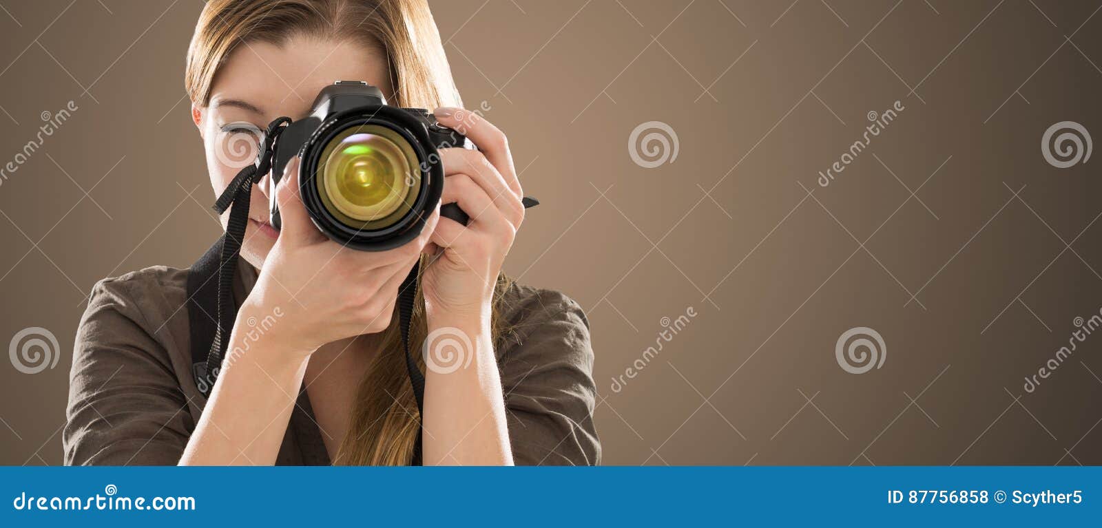 Portrait of a Photographer Covering Her Face with Camera. Stock Photo ...