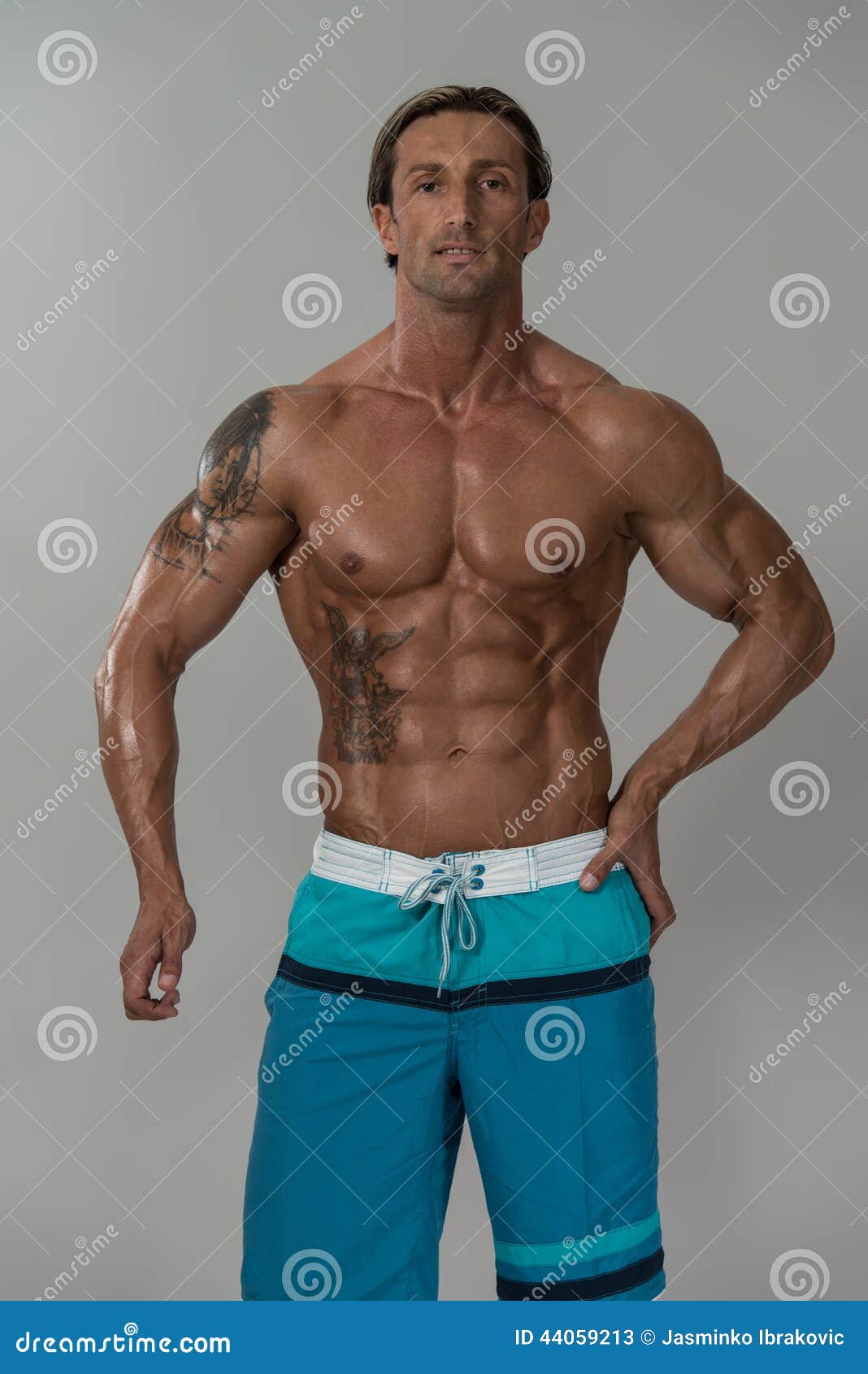 Portrait of a Physically Man on Grey Background Stock Image - Image of ...