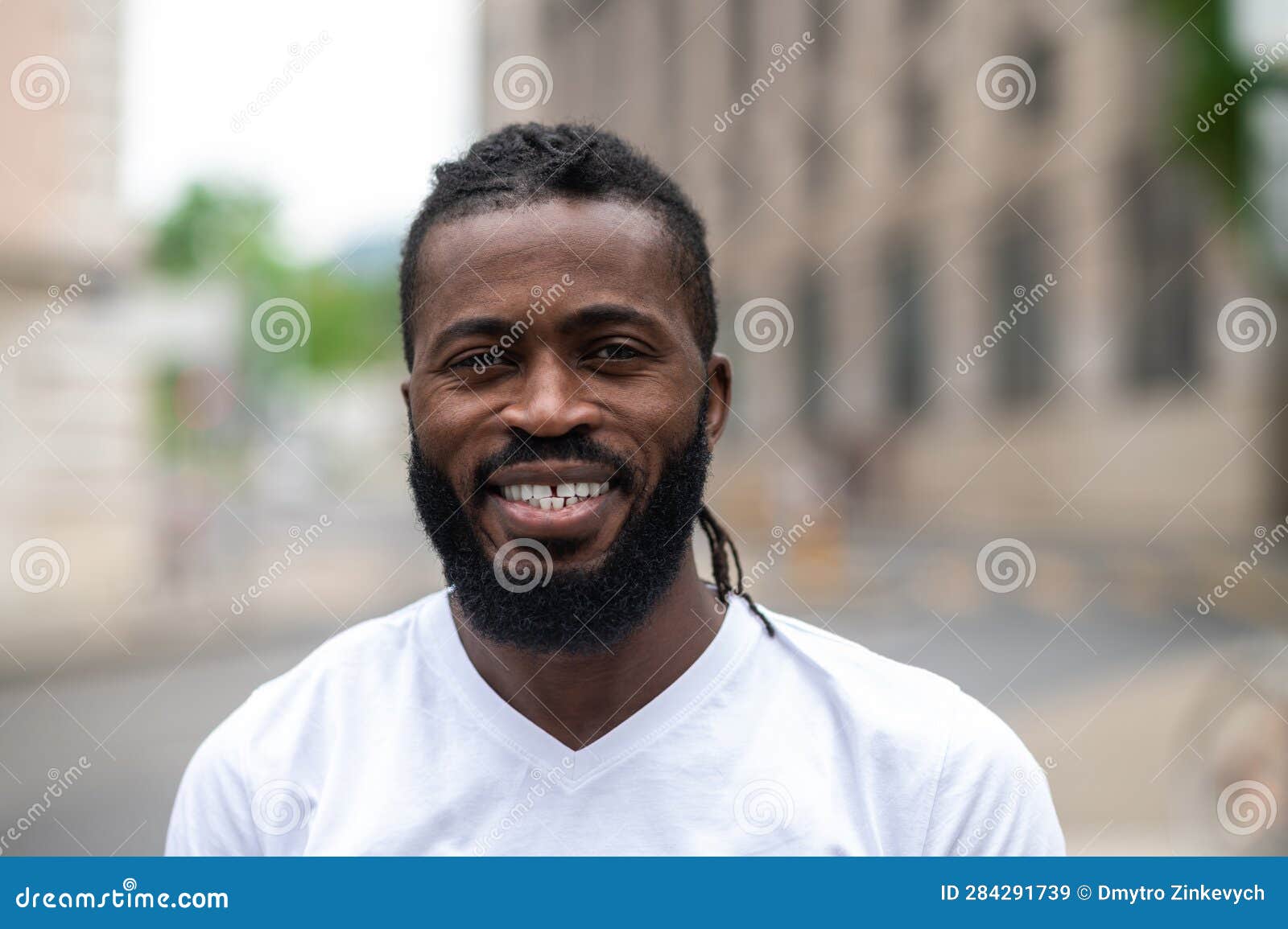 Portrait Picture Of A Smiling Dark Skinned Handsome Man Stock Image