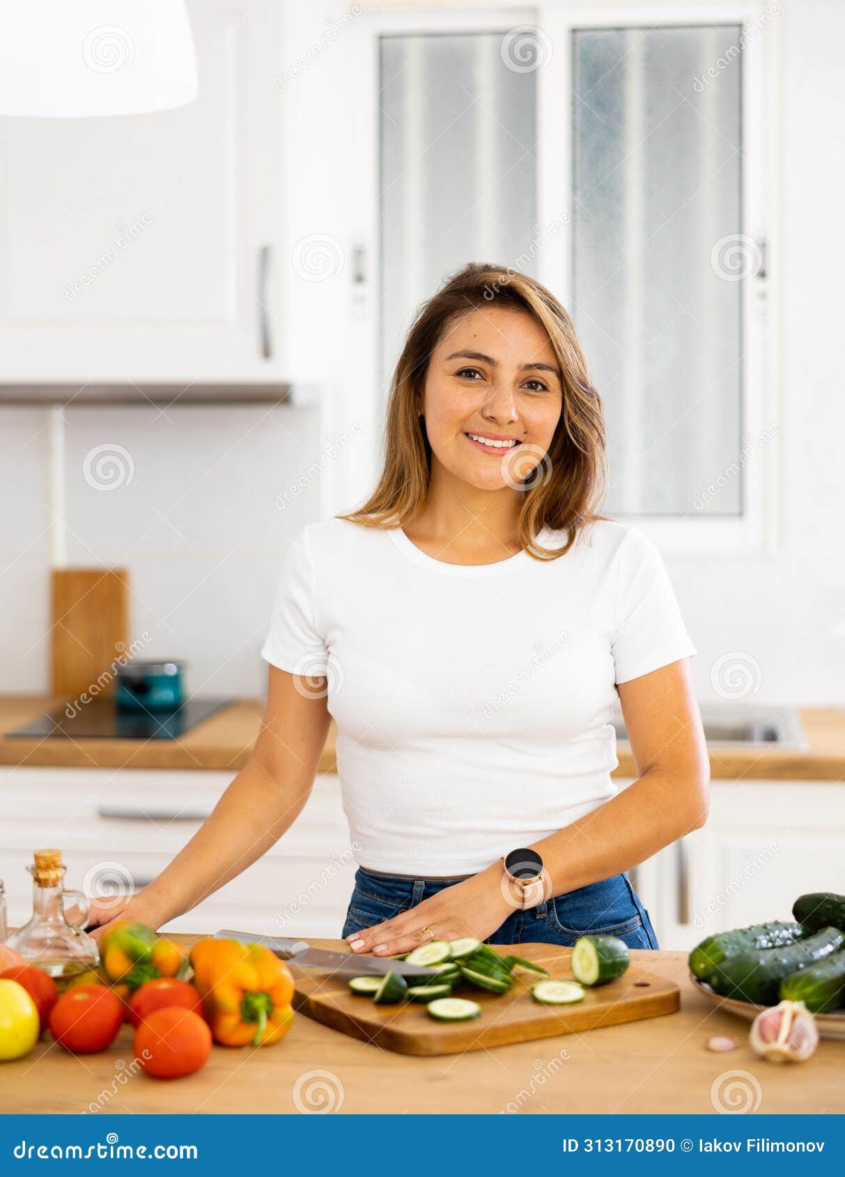 Portrait of Pleased Housewife Preparing Salad in Kitchen Stock Photo ... Portrait of Pleased Housewife Preparing Salad in Kitchen Stock Photo ...