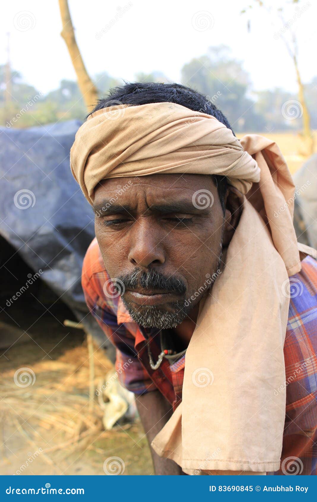 Portrait of a poor worker. editorial image. Image of downcast - 83690845