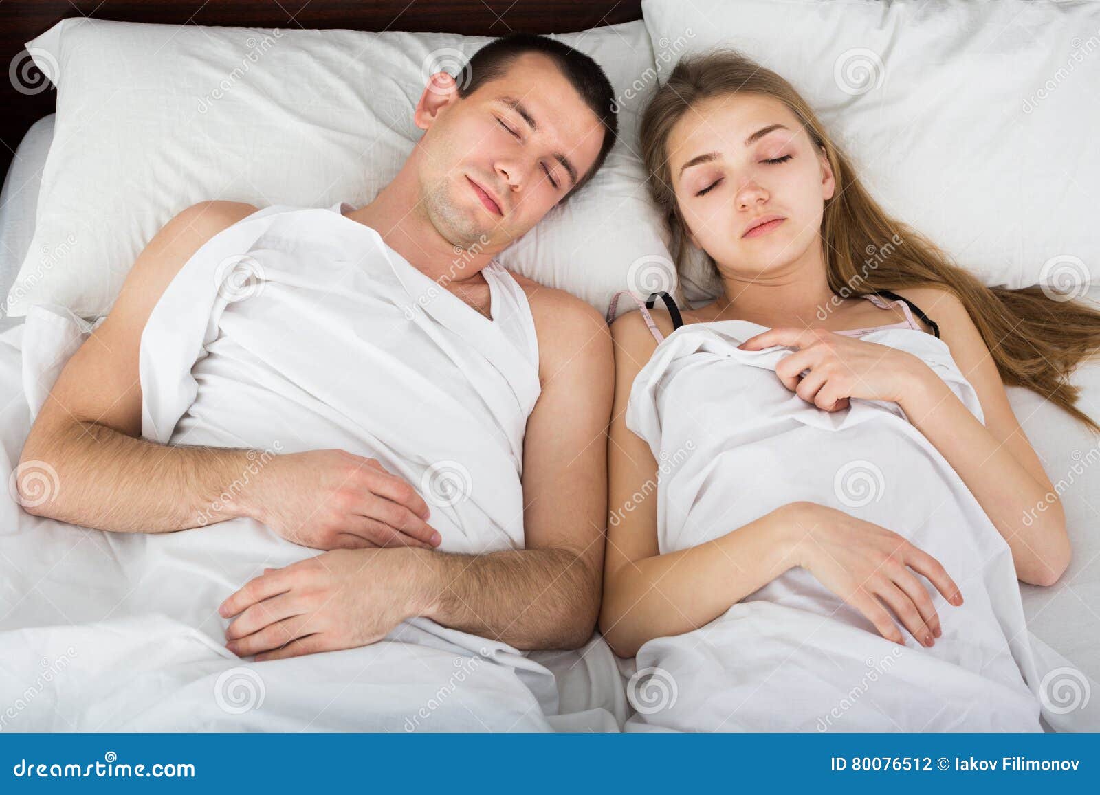 Portrait of Positive Couple Napping in Bed Stock Photo - Image of ...
