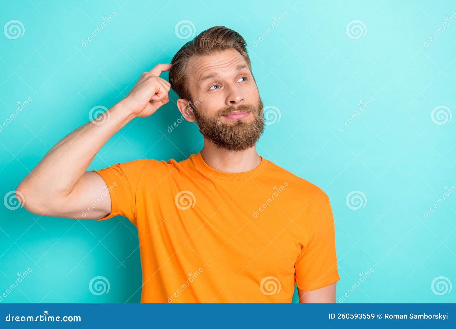 Portrait Of Positive Intelligent Guy With Blond Hairdo Wear Orange T