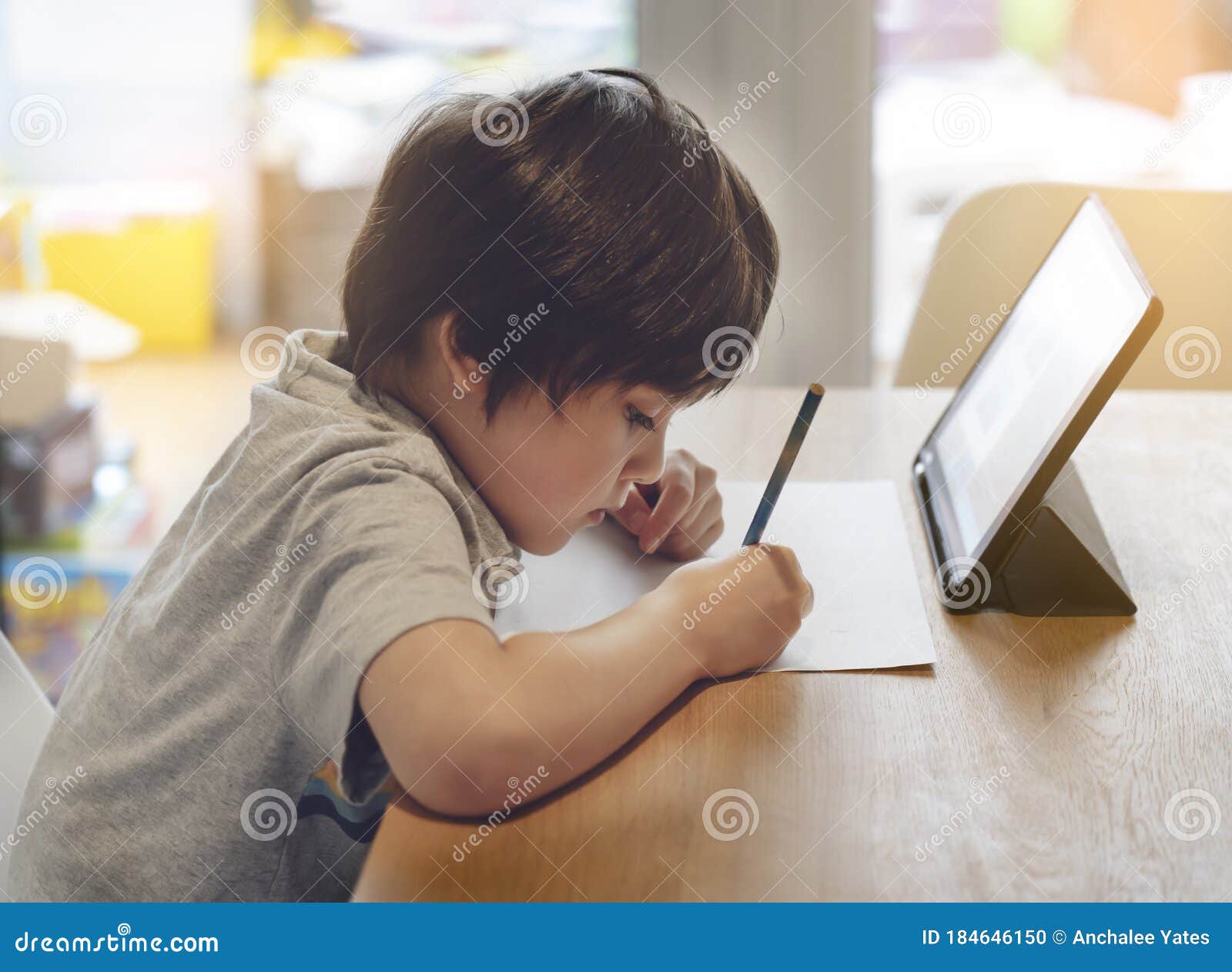 Portrait of Preschool Kid Using Tablet for His Homework,Soft Focus of ...