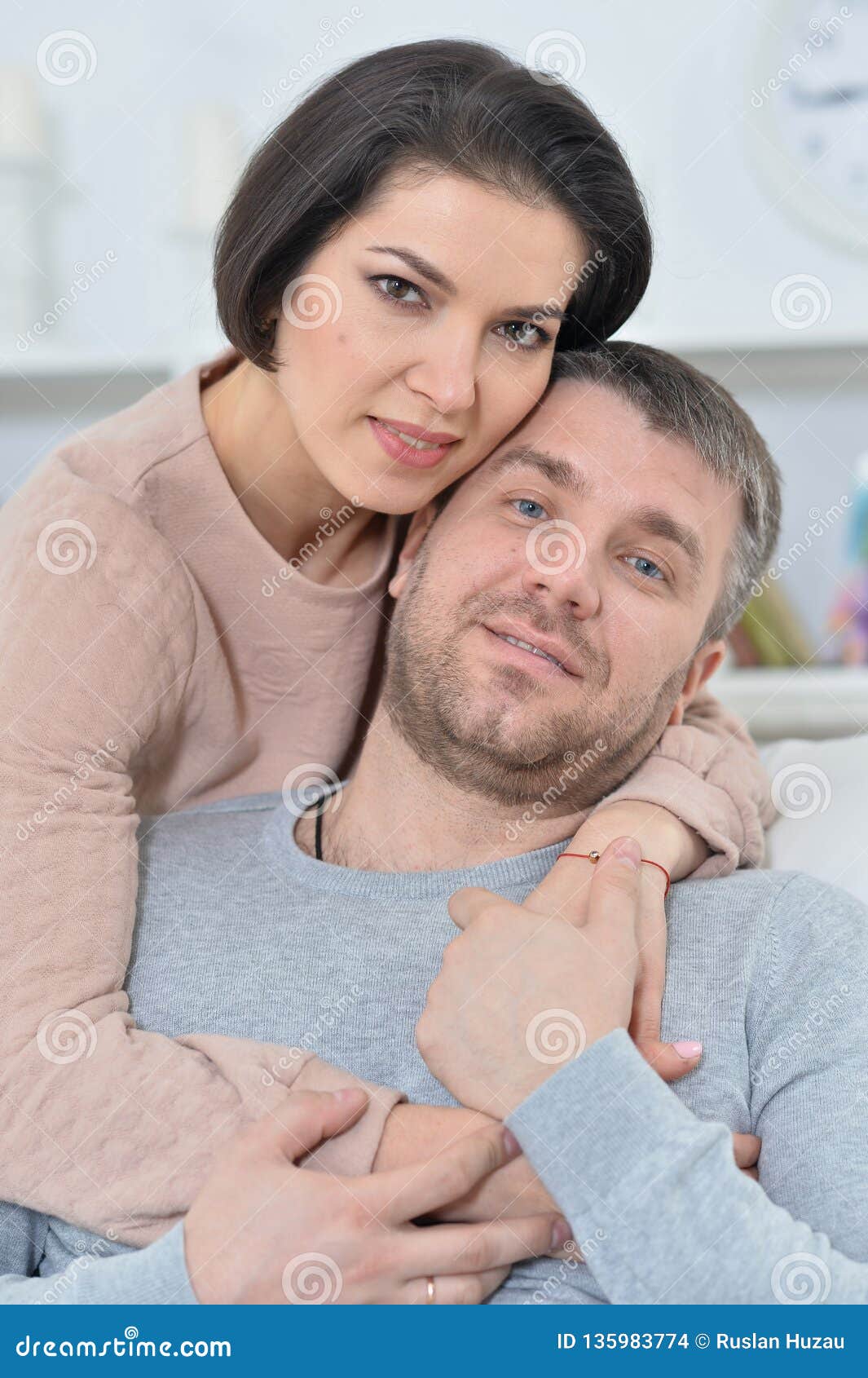Portrait of a Pretty Couple Posing at Home Stock Photo - Image of young ...
