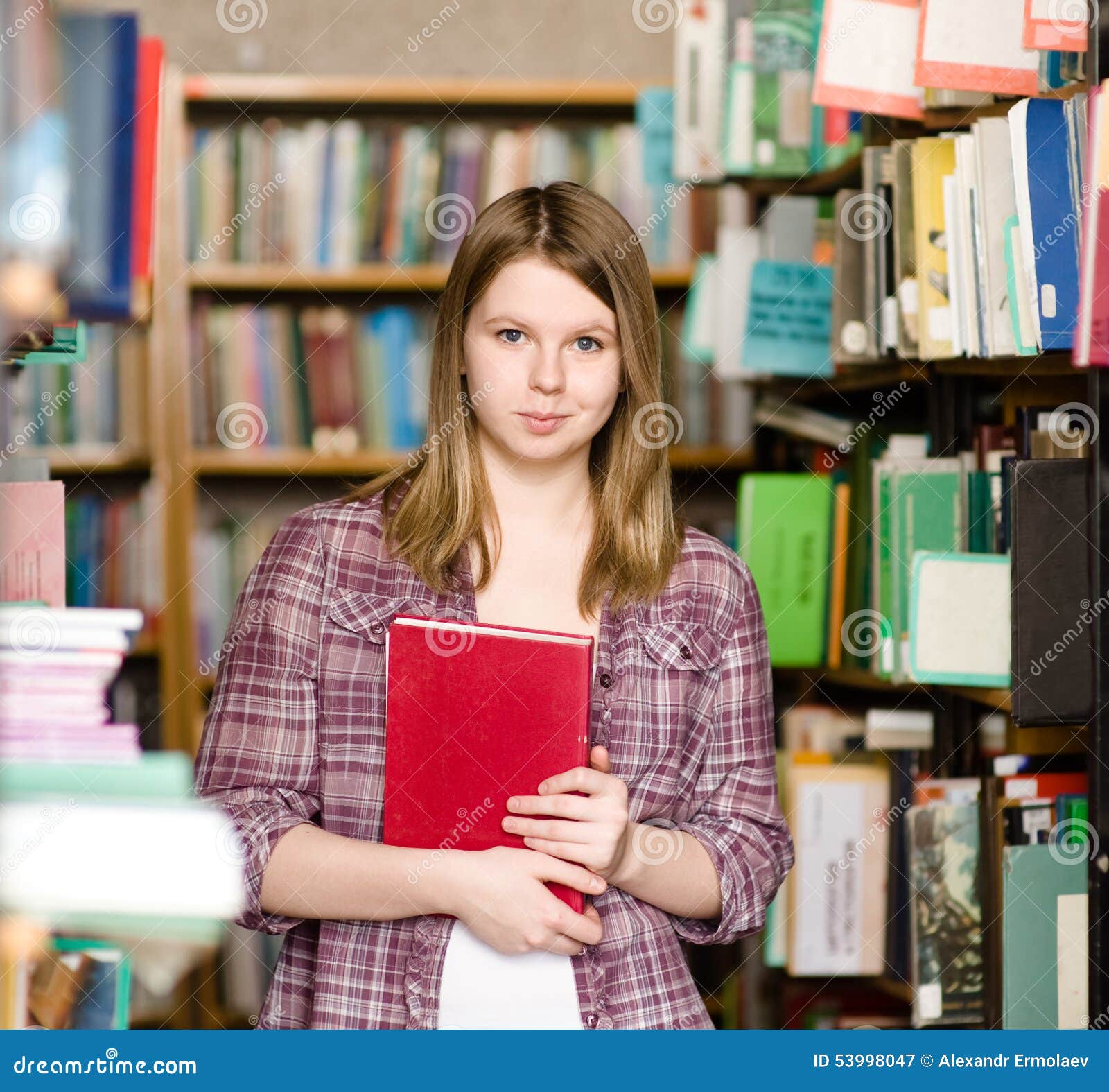 Portrait of Pretty Girl in Library Looking at Camera Stock Image ...