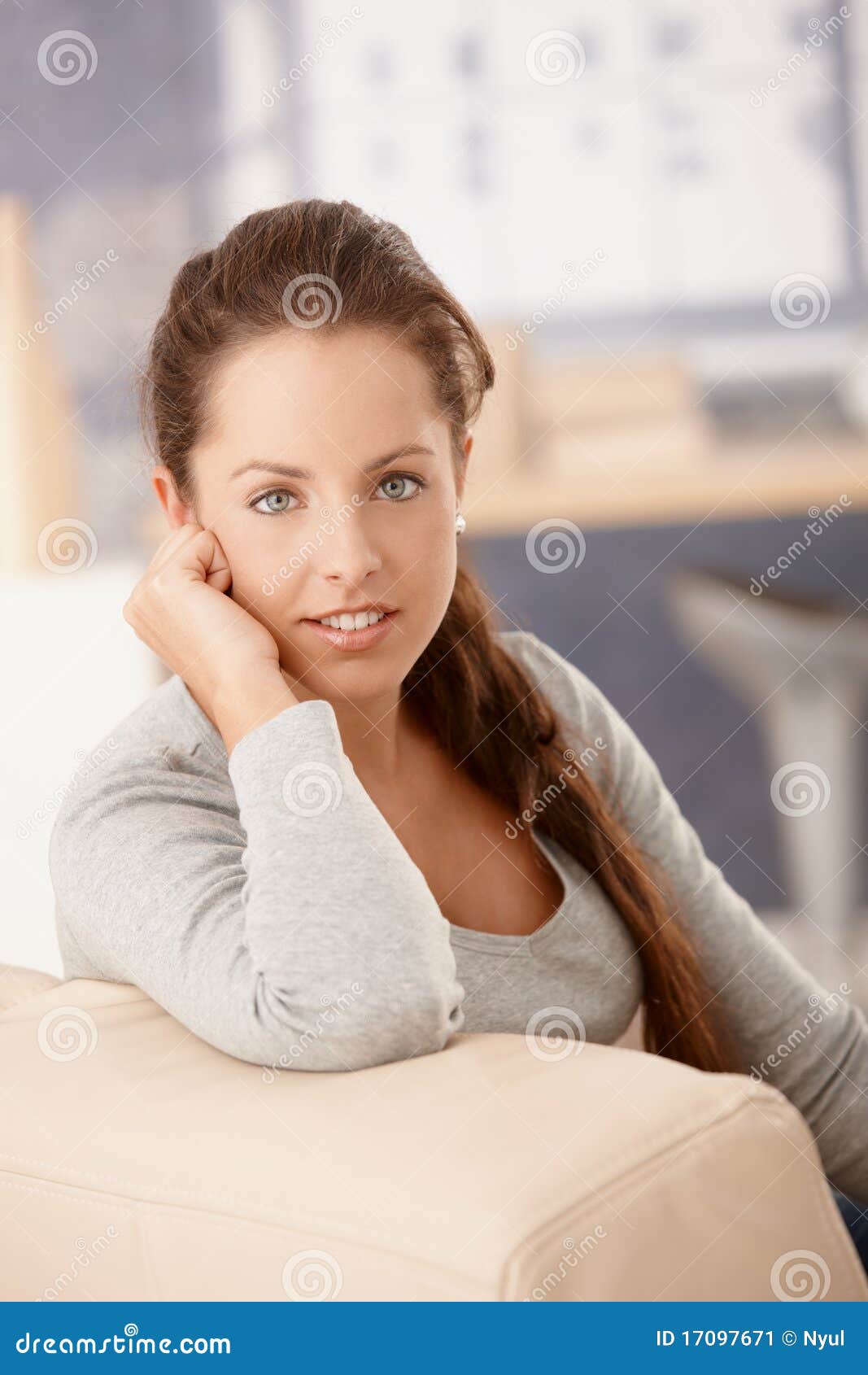 Portrait of Pretty Girl Sitting on Sofa Smiling Stock Image - Image of ...