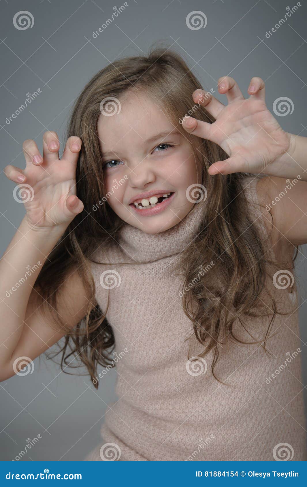 Portrait of a Pretty Girl Snarling. Stock Photo - Image of clothing ...