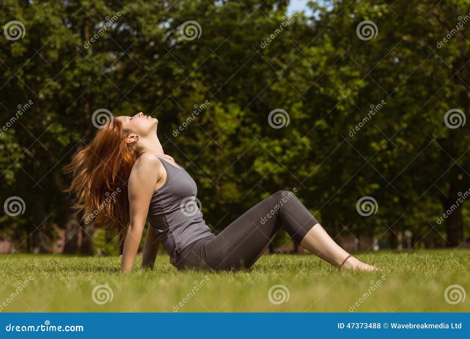 Portrait of a Pretty Redhead Relaxing Stock Photo - Image of side ...