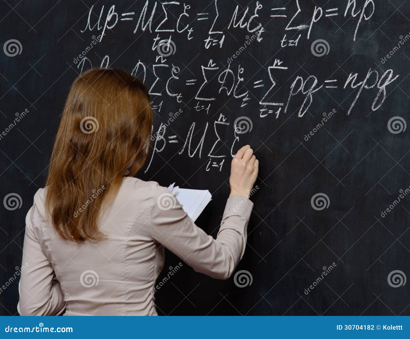 Portrait of a Pretty Student Doing Maths on a Blackboard Stock Photo ...