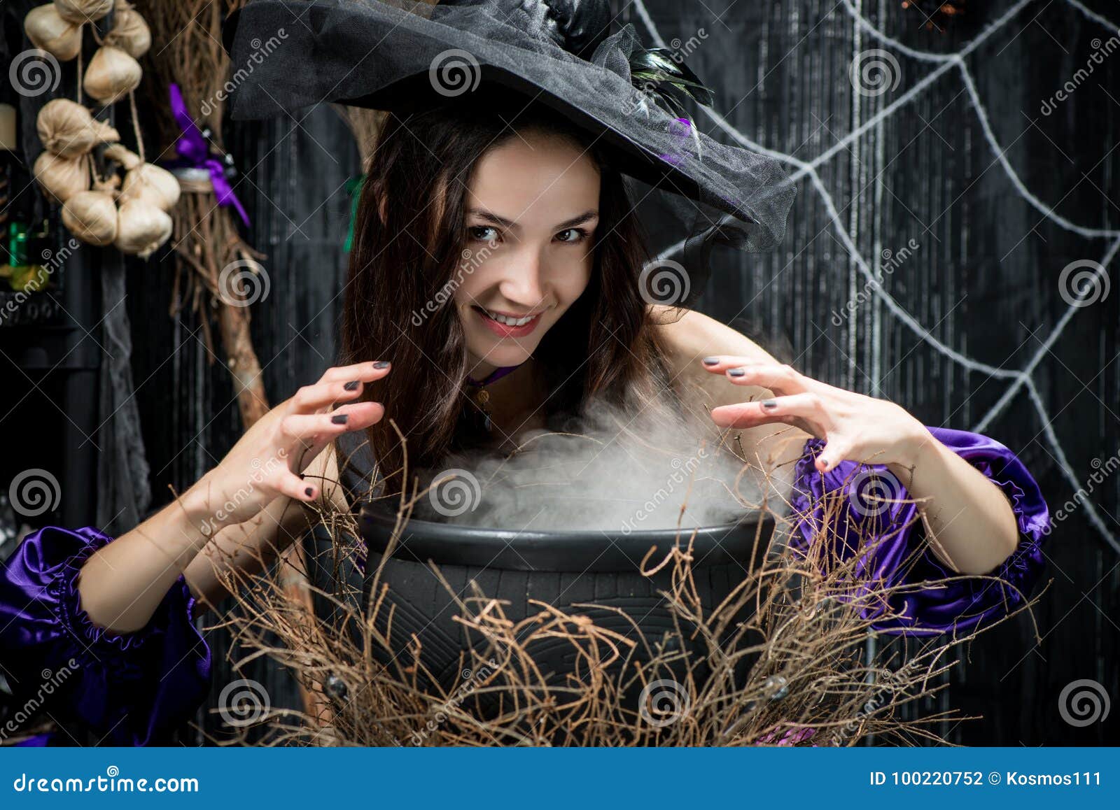 Portrait of a Pretty Witch with a Pot for Cooking Stock Photo - Image ...