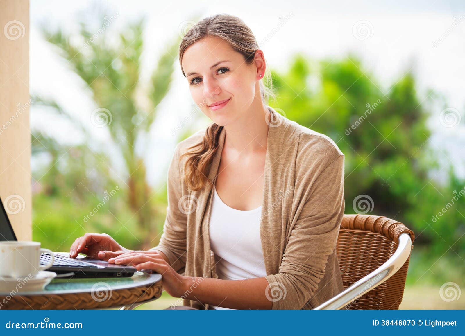 Portrait of a Pretty Young Woman Working on Her Computer Stock Photo ...