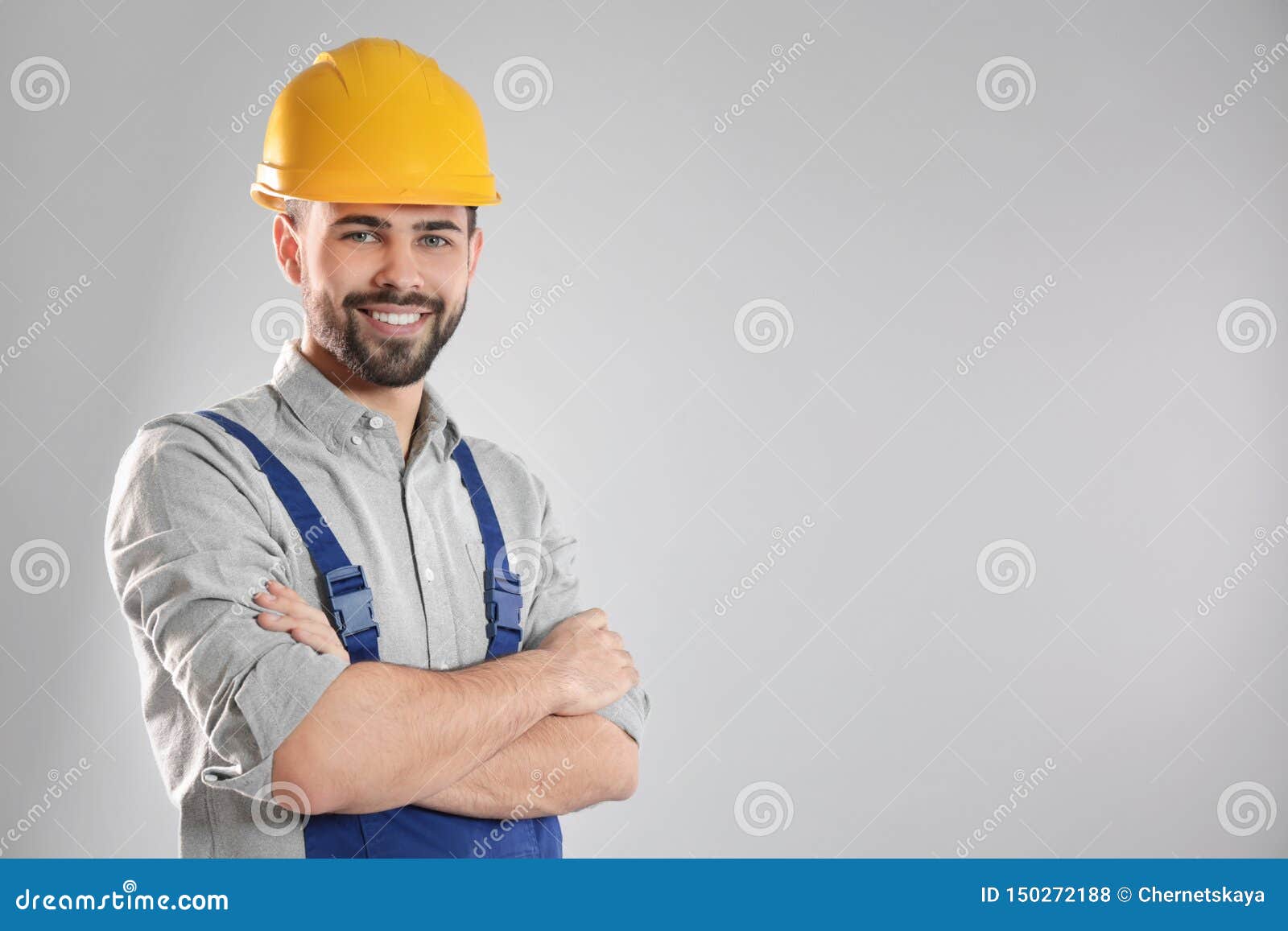 Portrait of Professional Construction Worker in Uniform on Grey ...
