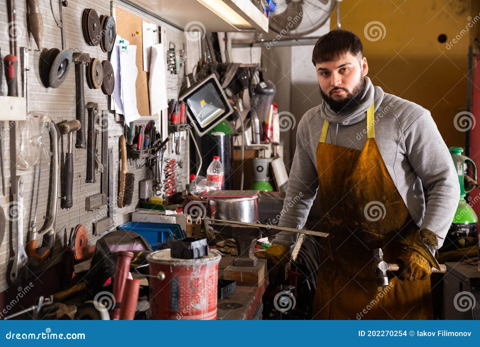 Professional Man Worker during Work with Steel in Workshop Stock Photo ...