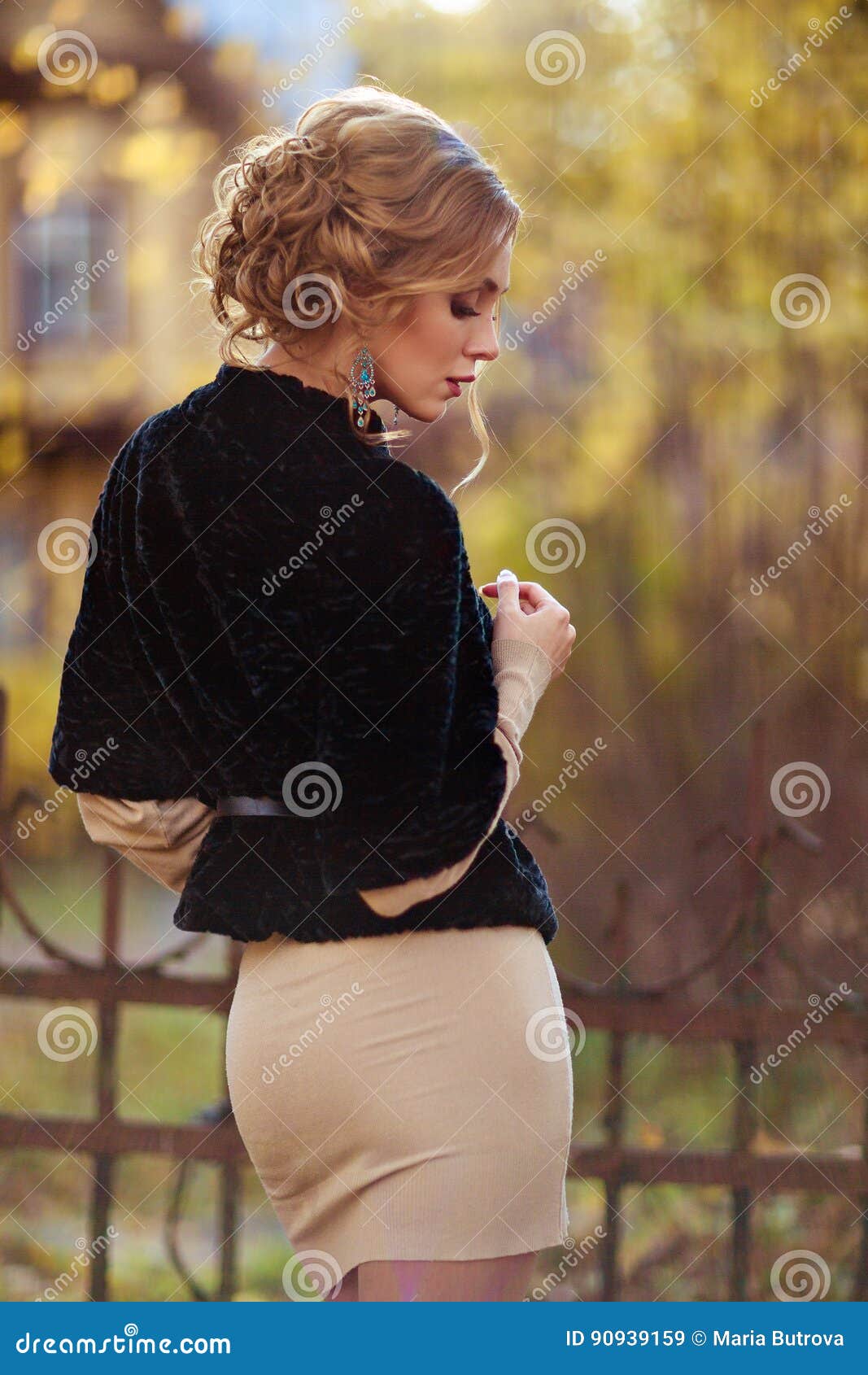 Portrait In Profile Of A Sensual Kinky Girl In Black Coat Autumn Stock