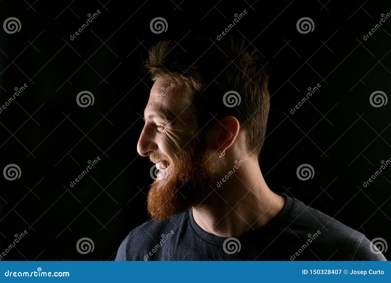 Portrait of Profile of a Smiling Man on Black Background Stock Image ...