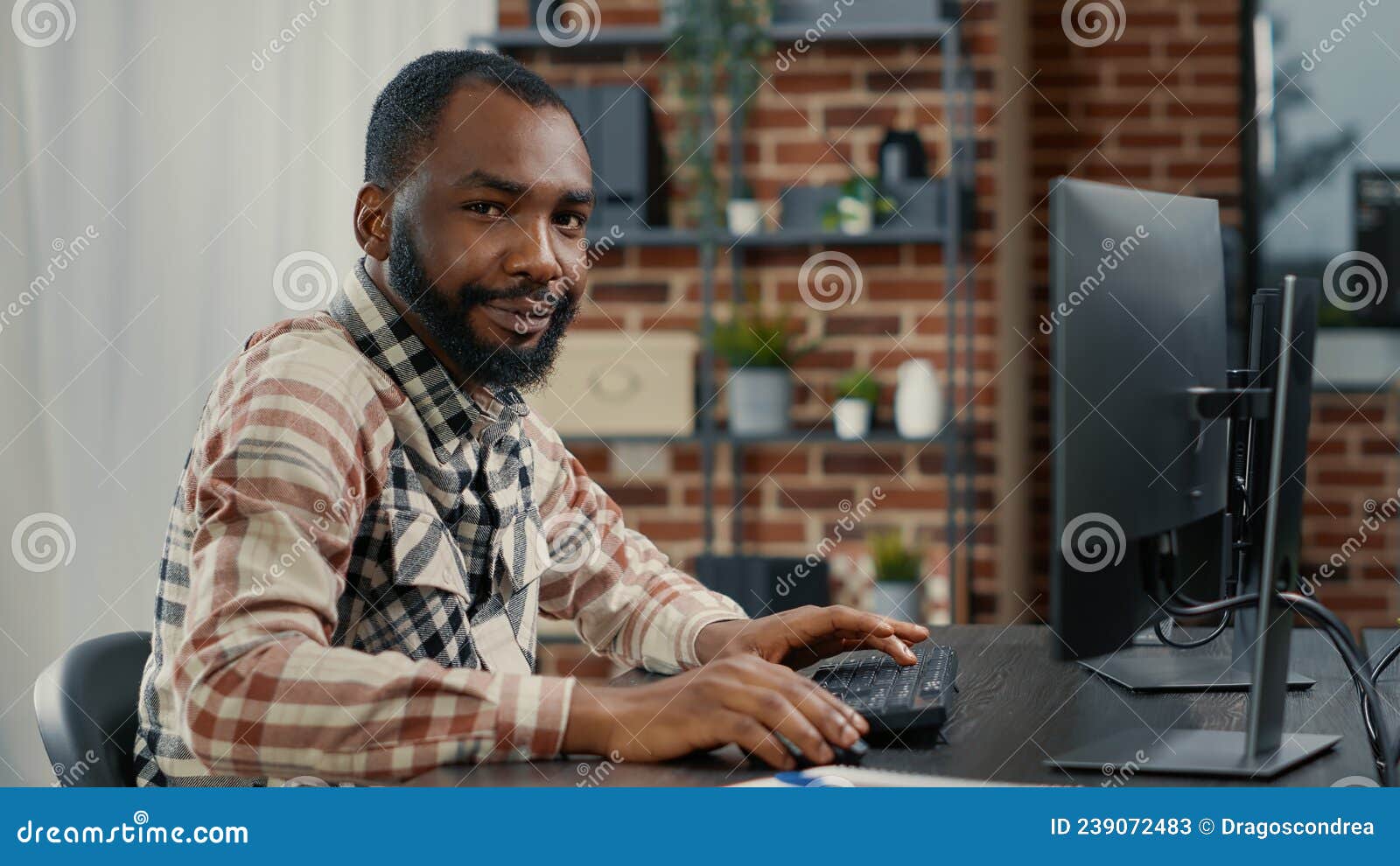 Portrait of Programer Typing Programming Code on Computer Keyboard Turning Head and Smiling ...