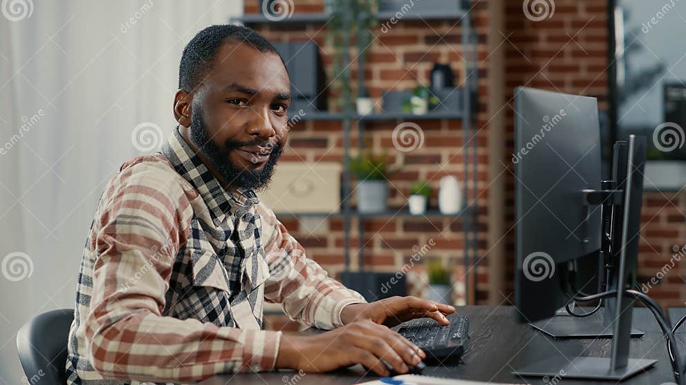 Portrait of Programer Typing Programming Code on Computer Keyboard Turning Head and Smiling ...