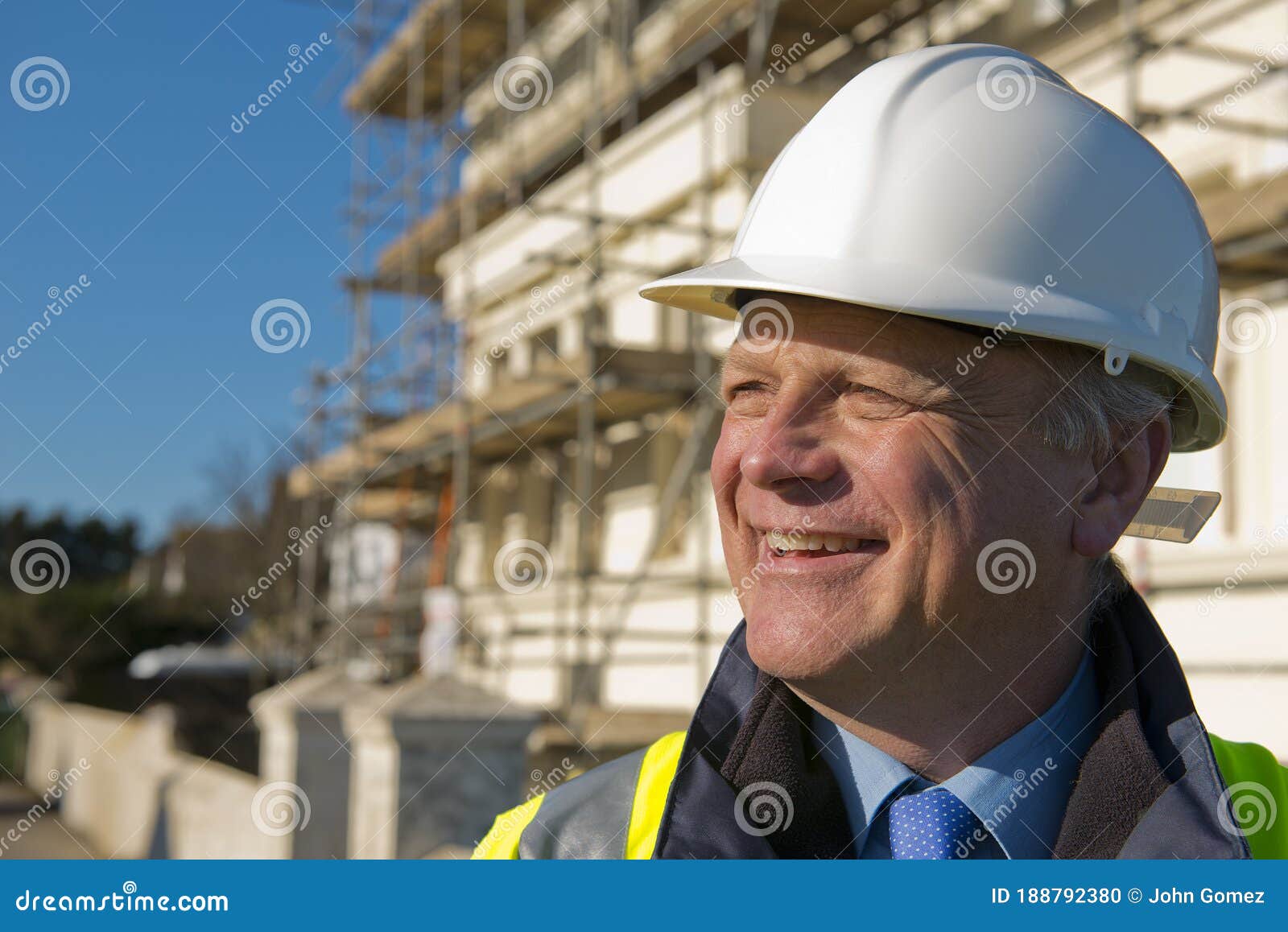 Portrait of a Property Developer / Builder with Construction Site ...