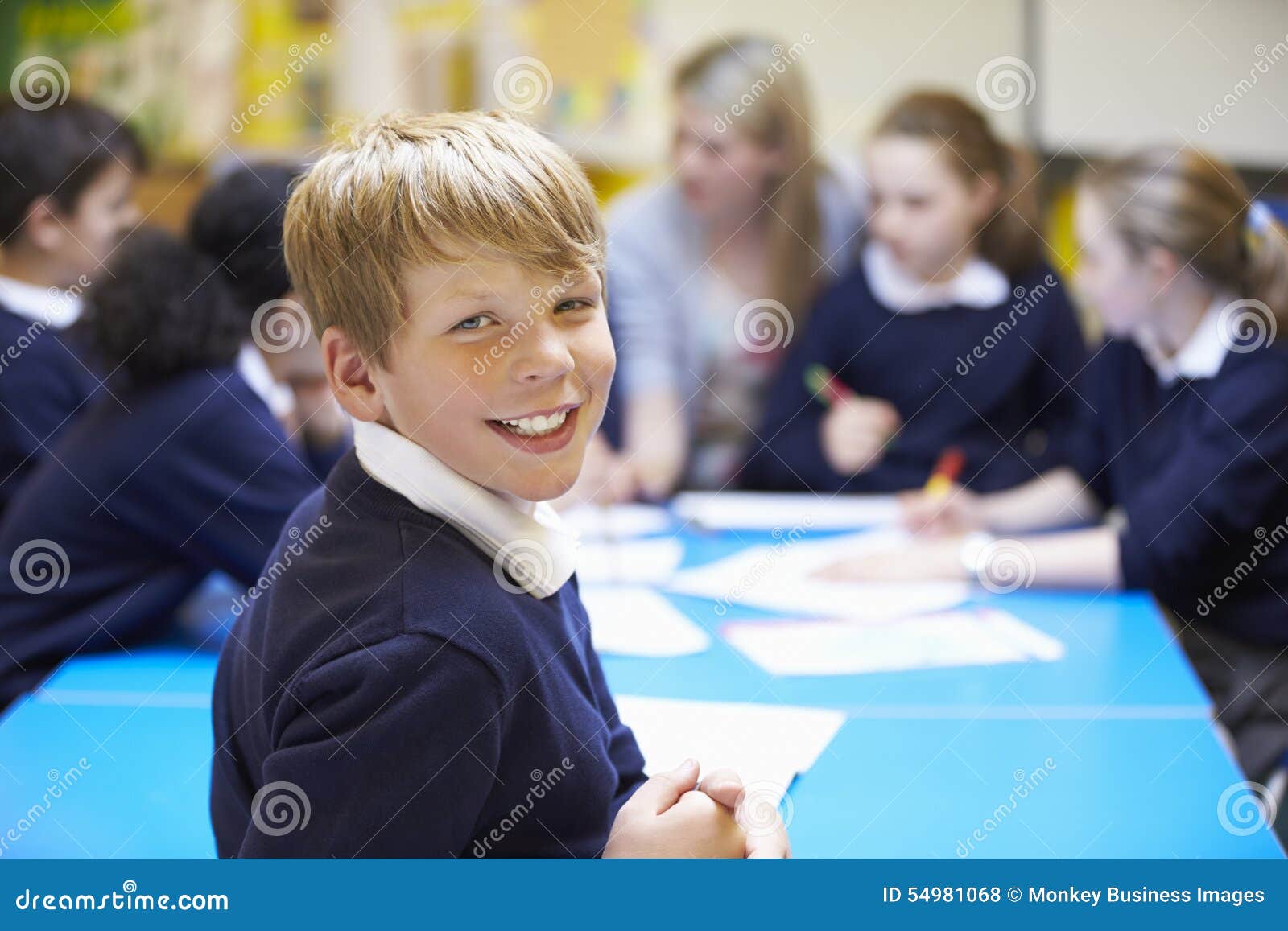 Portrait of Pupil in Classroom with Teacher Stock Photo - Image of ...