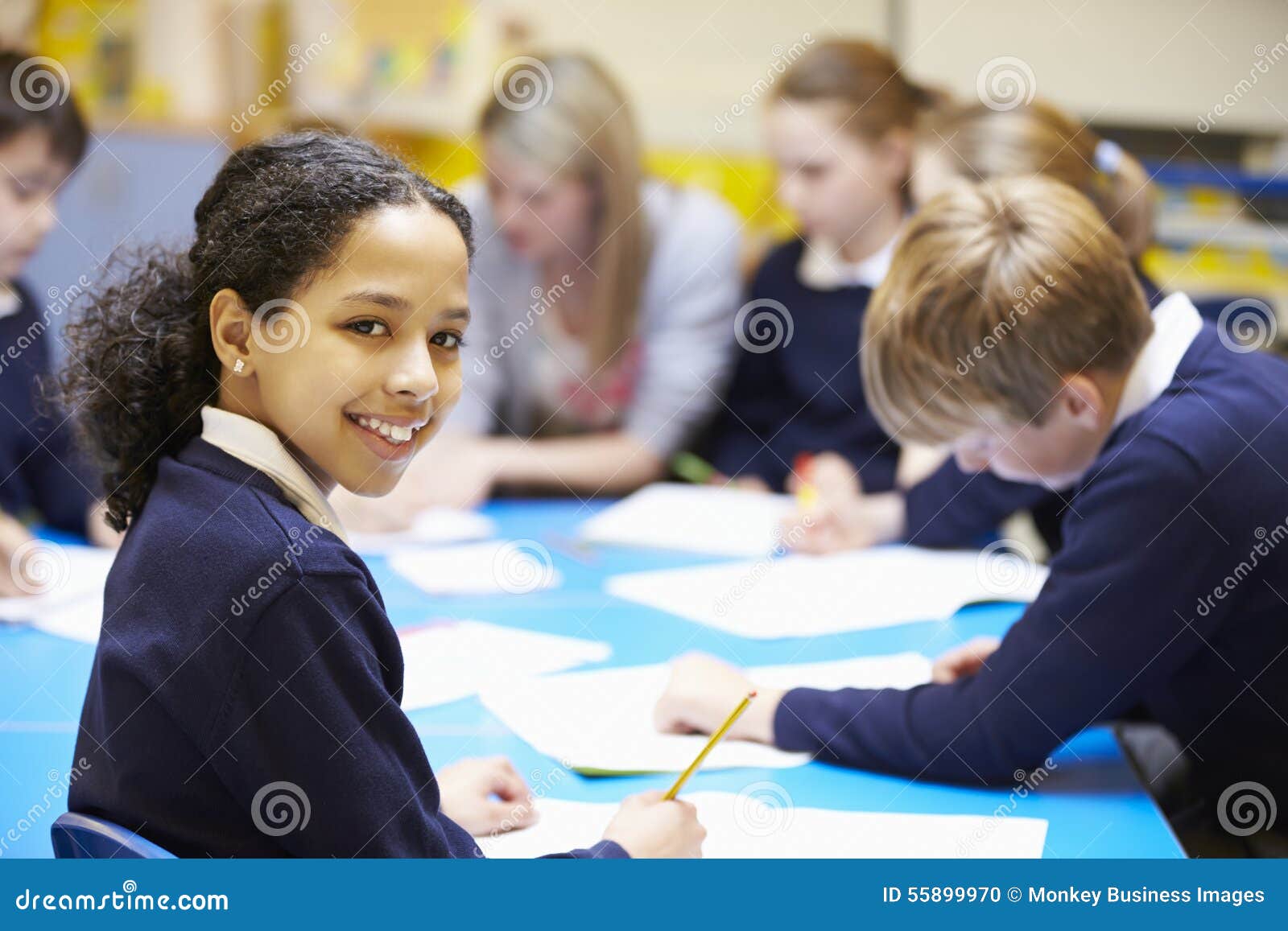 Portrait of Pupil in Classroom with Teacher Stock Photo - Image of ...