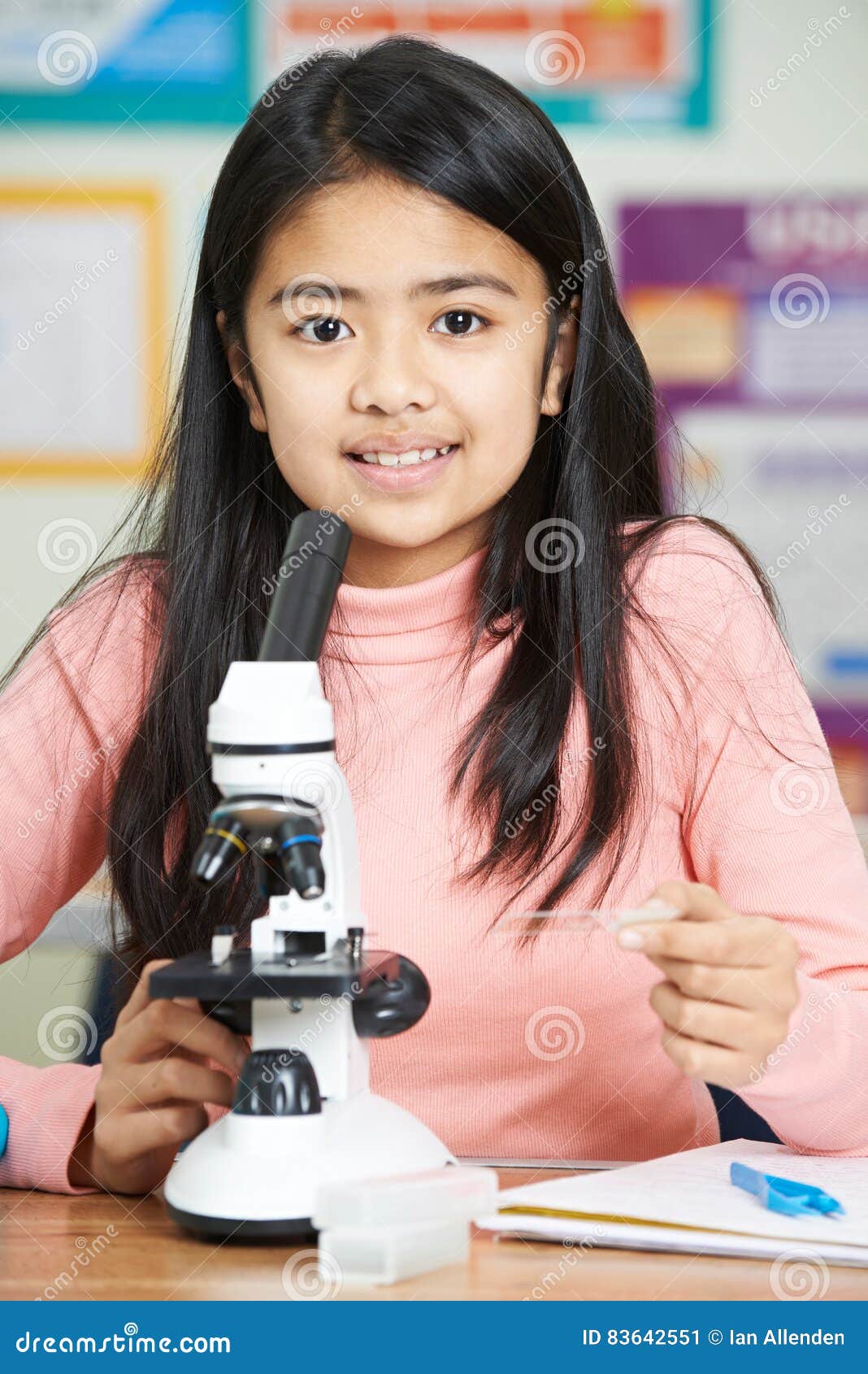 Portrait of Pupil in Science Class Using Microscope Stock Image - Image ...