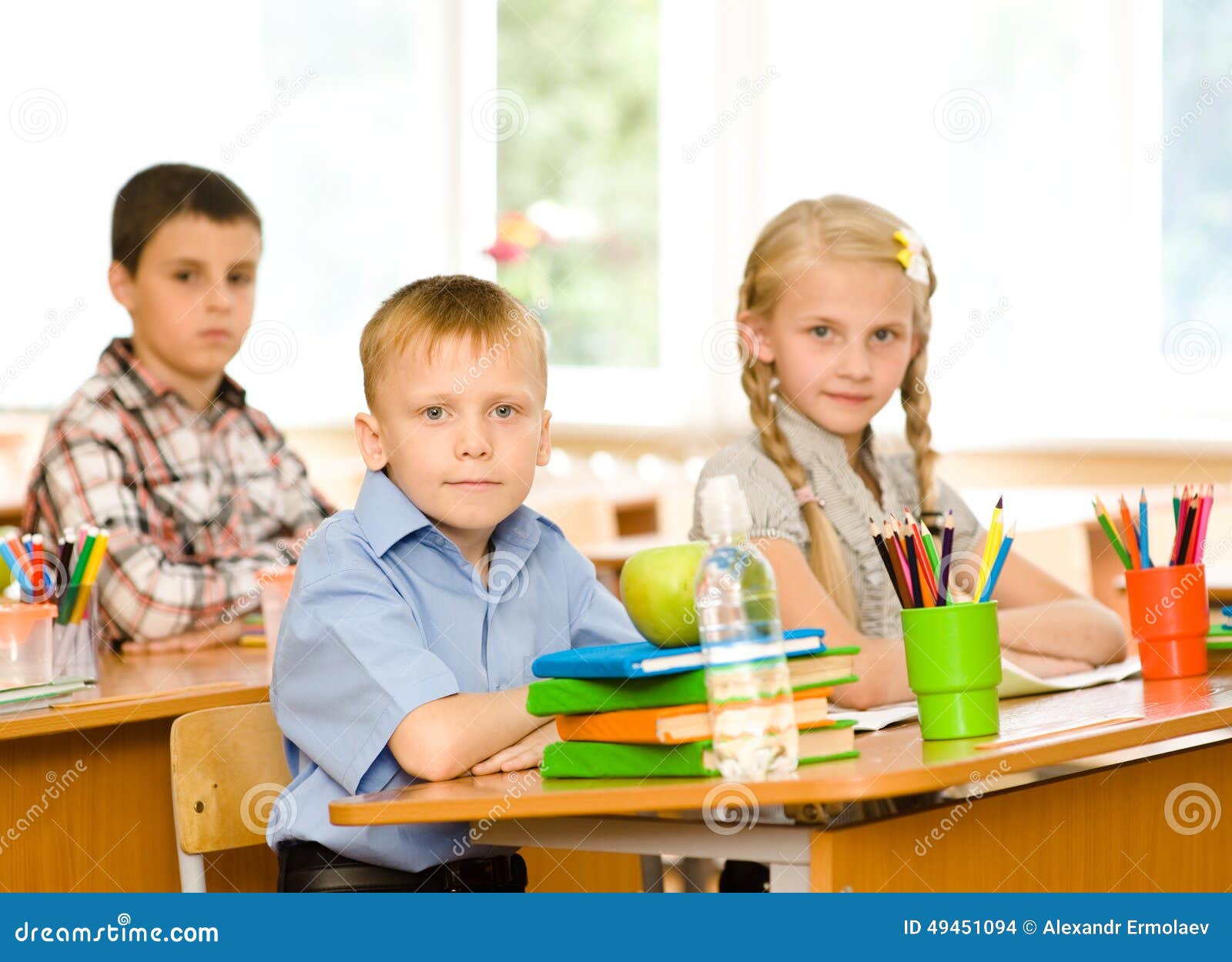Portrait of Pupils Looking at Camera in Classroom Stock Photo - Image ...