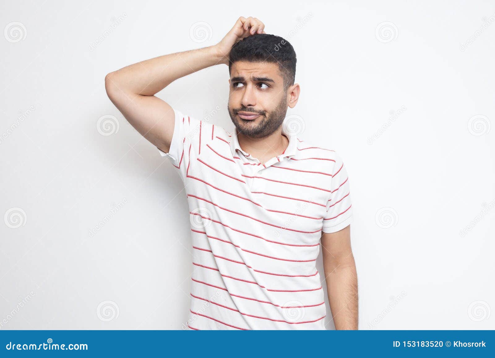Portrait Of Query Handsome Bearded Young Man In Striped T Shirt