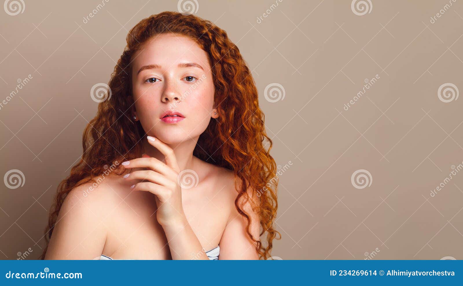Portrait Of Red Haired Girl With Long Curly Hair And Cute Freckles On