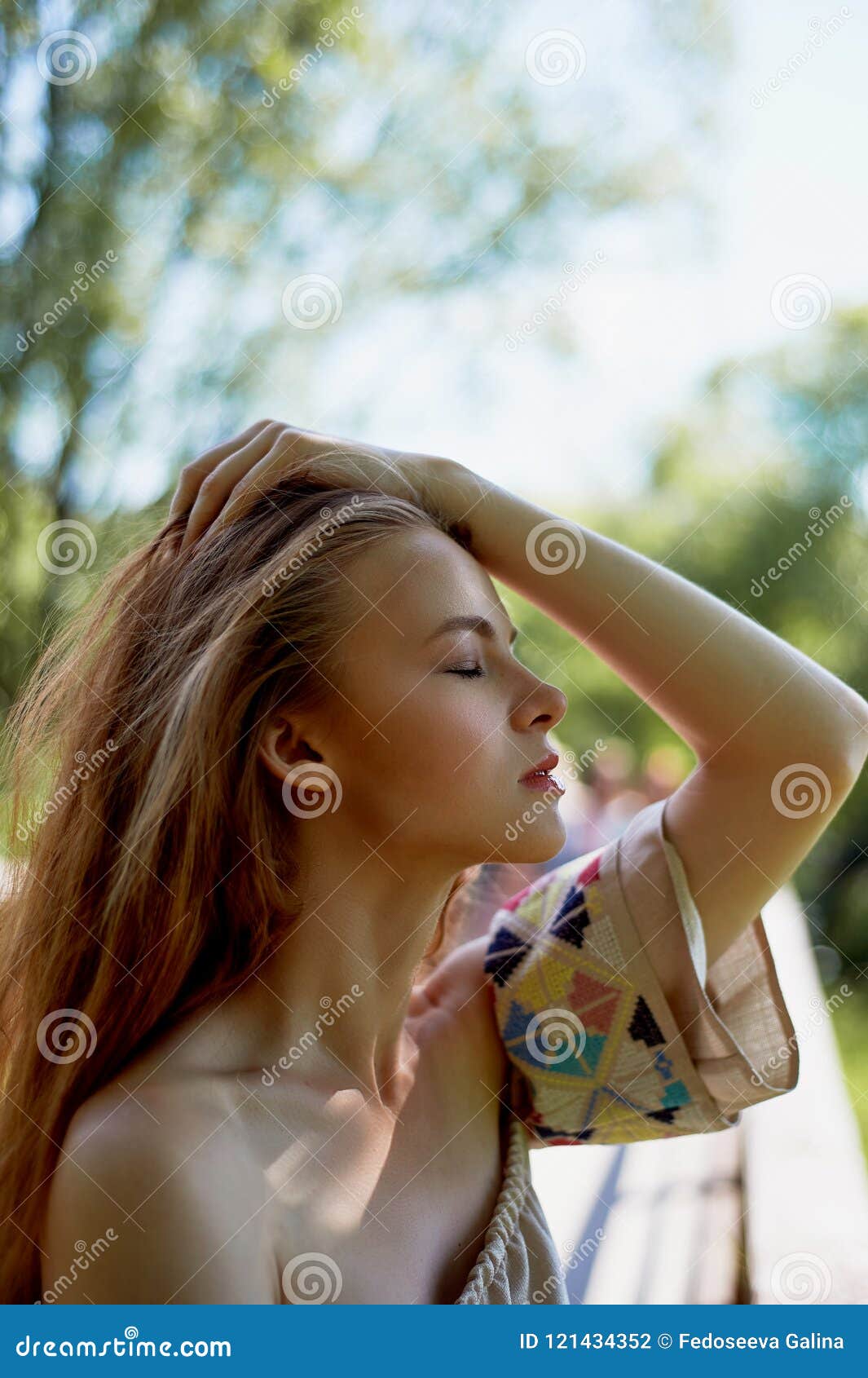 Portrait Of A Red Haired Girl With Long Hair Hair Down Artistic