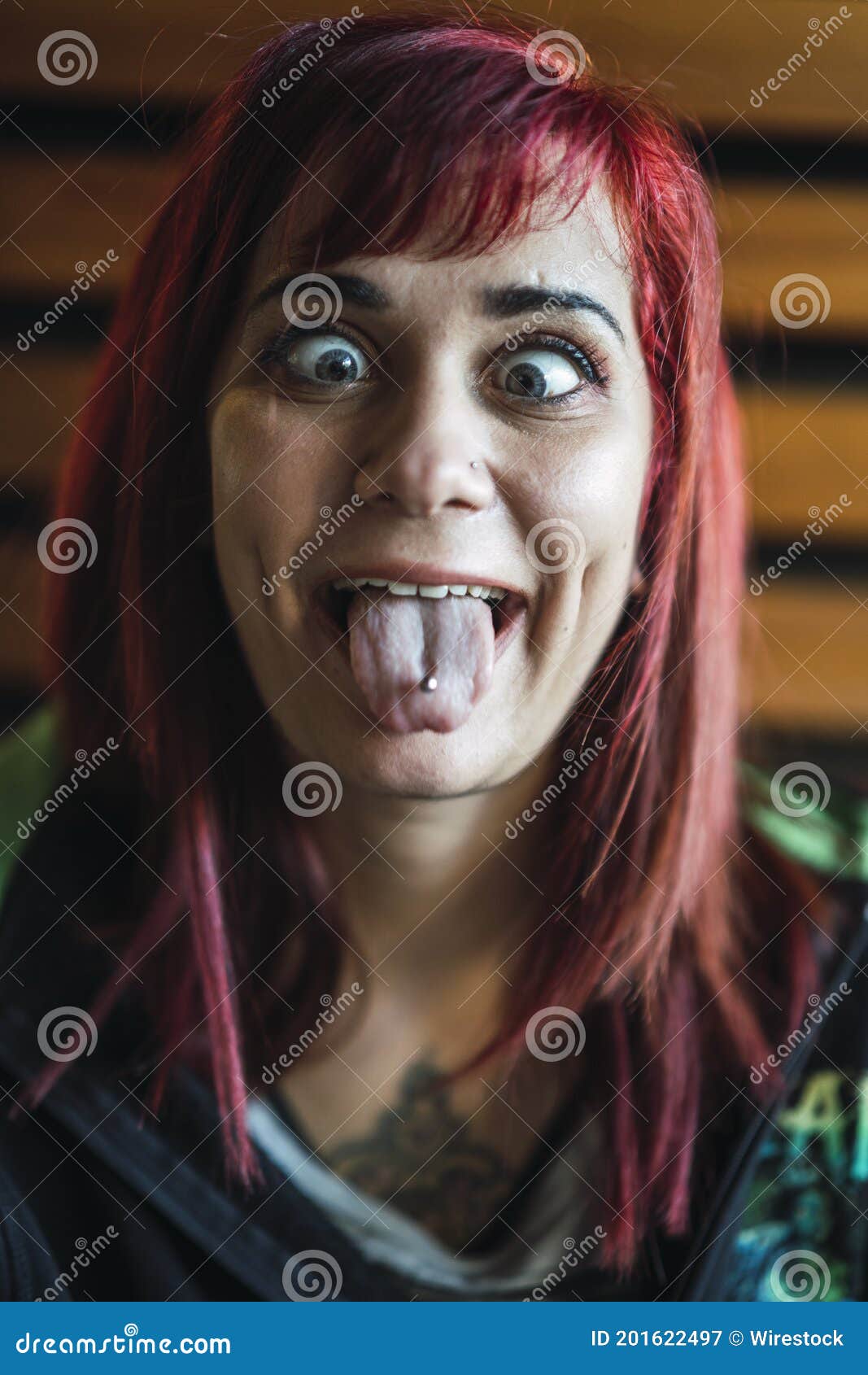 Portrait of a Redheaded Female with a Silly Face Expression Stock Image ...