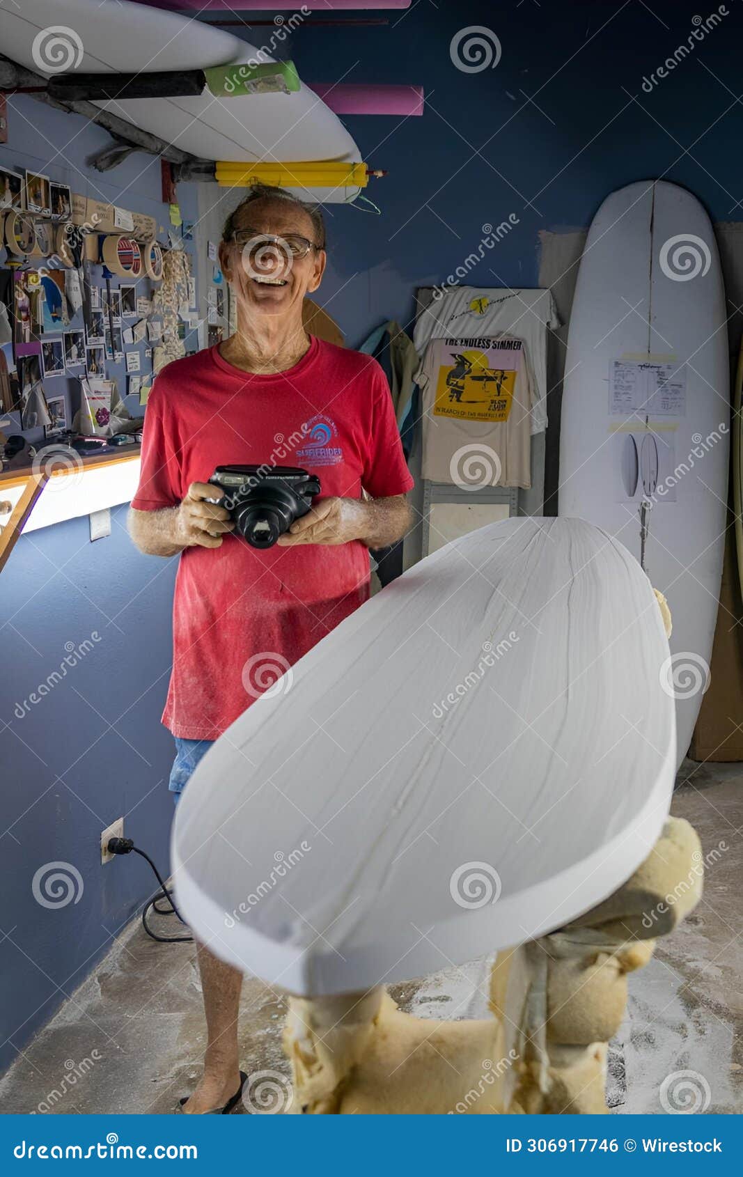 Portrait of Robert August in the Workshop Standing Next To a Surfboard ...
