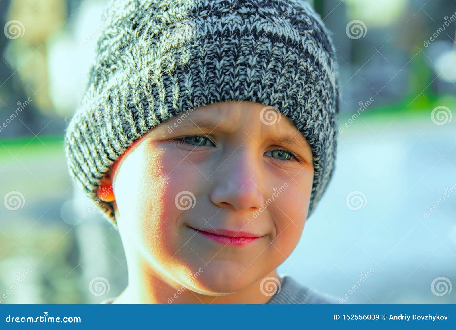 Portrait of a Sad and Sad Boy in a Gray Knitted Hat Stock Image - Image ...