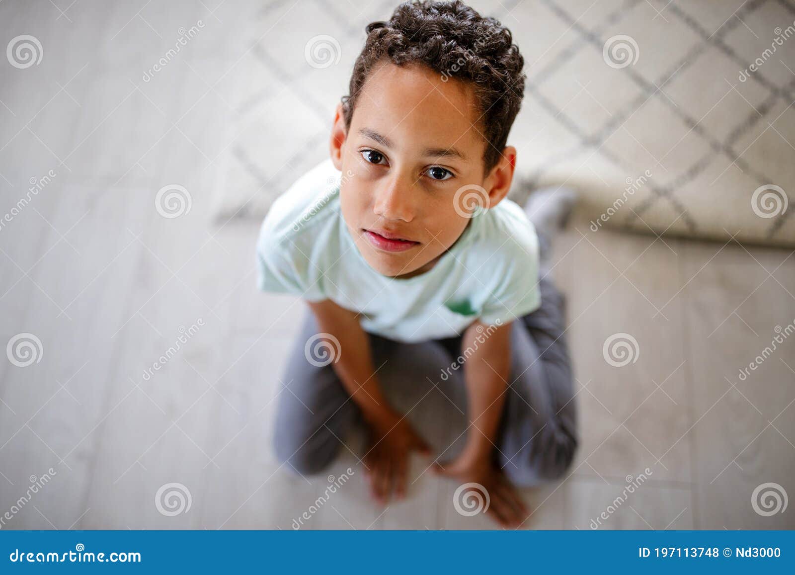 Portrait of Sad African Boy Sitting on a Floor Stock Photo - Image of ...