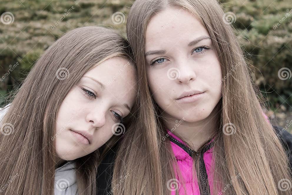 Portrait of sad twins stock photo. Image of playful, white - 27326102