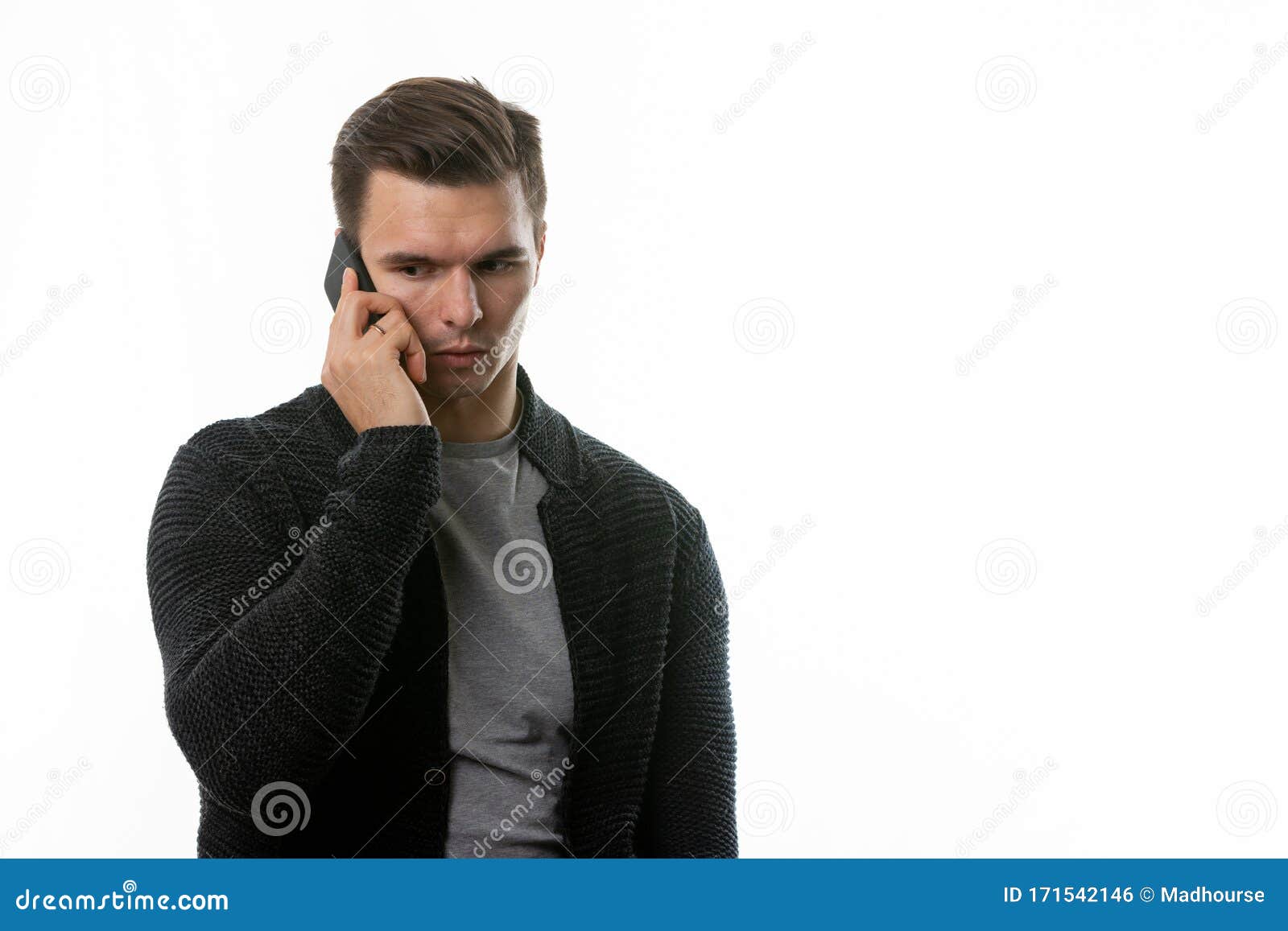 Portrait of a Sad Young Man Talking on the Phone Stock Photo - Image of ...