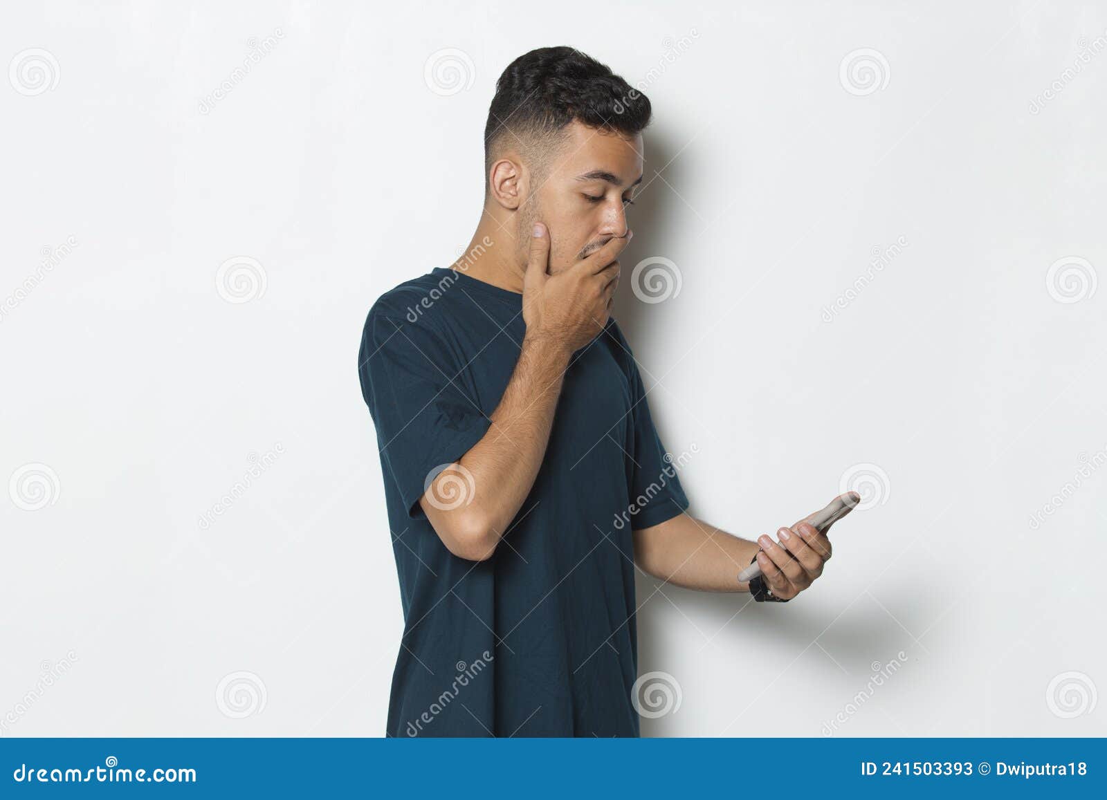 Sad Young Man Using Mobile Phone Isolated on White Background Stock ...