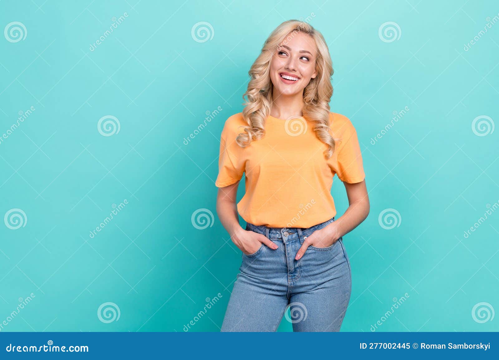 Portrait Of Satisfied Girl With Wavy Hairstyle Wear Yellow T Shirt Look