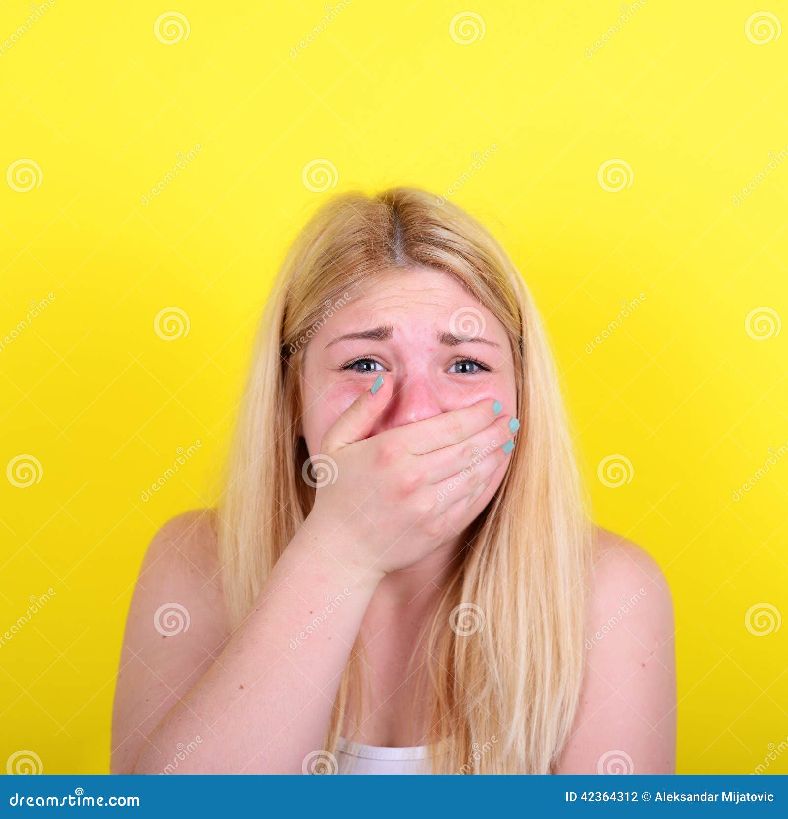 Portrait Of Scared Girl Against Yellow Background Royalty-Free Stock ...