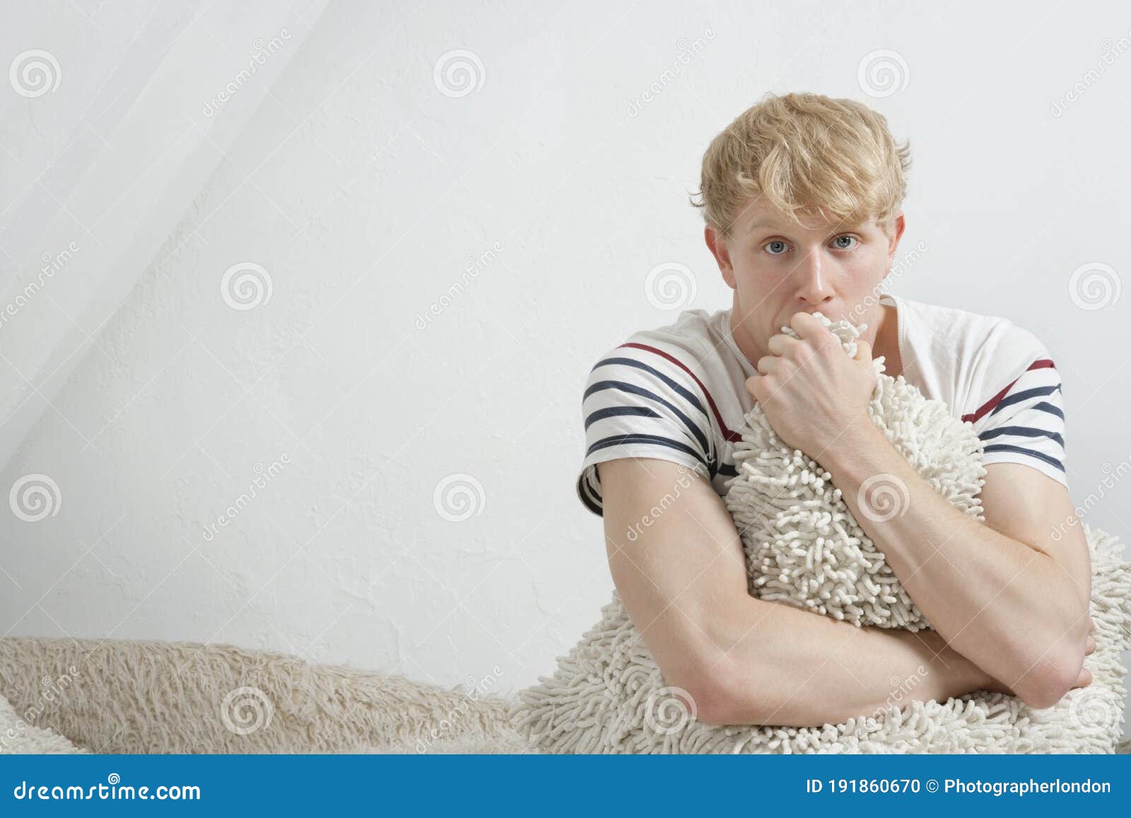 Portrait of a Scared Young Man Hugging Fur Blanket Stock Photo - Image ...