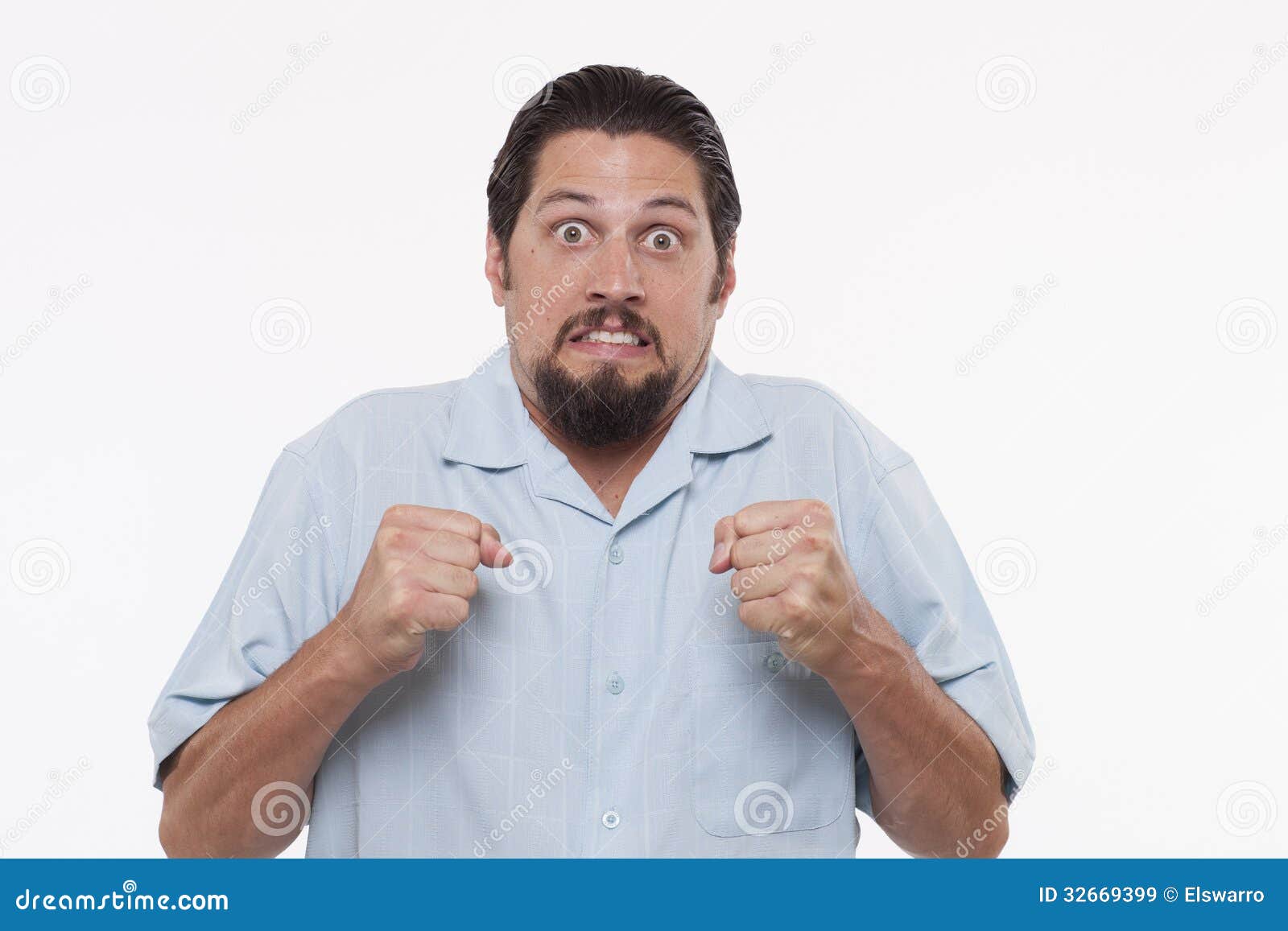 Portrait of a Scared Young Man Standing Against White Stock Image ...