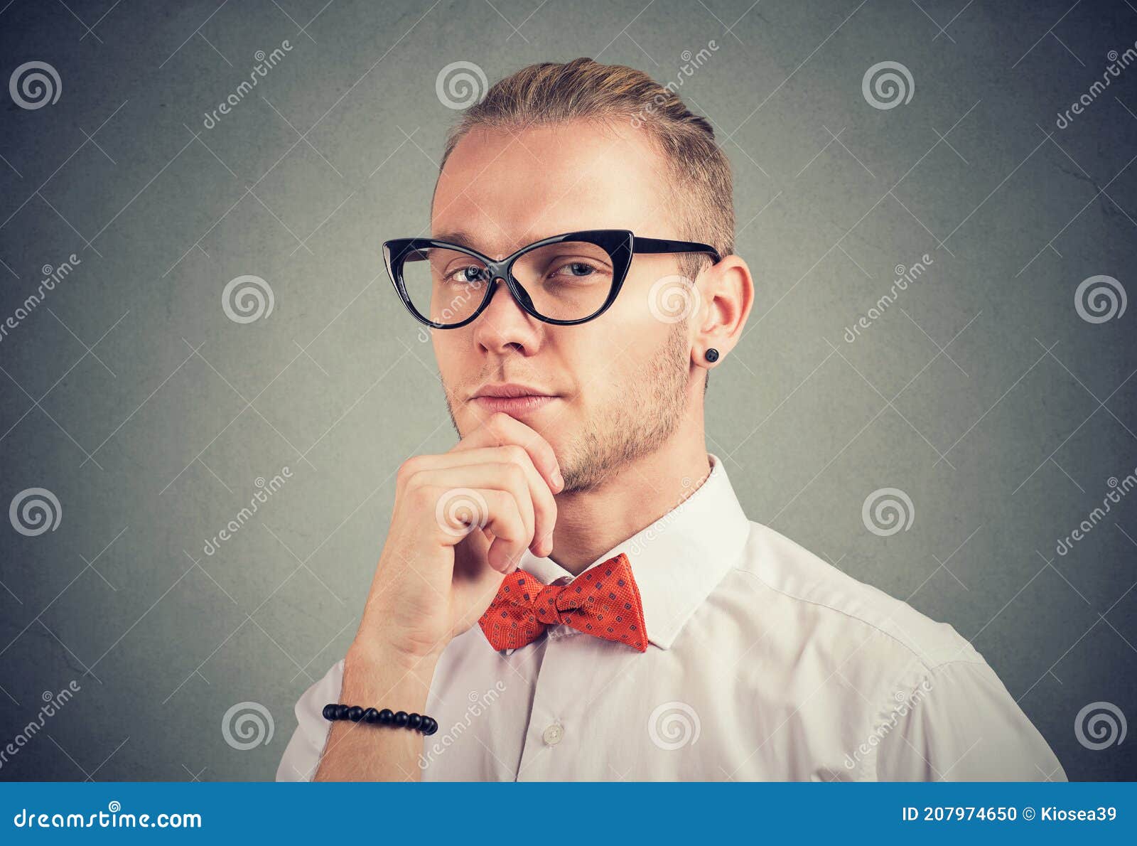 Portrait of a Sceptical Thoughtful Man Looking at Camera Stock Photo ...