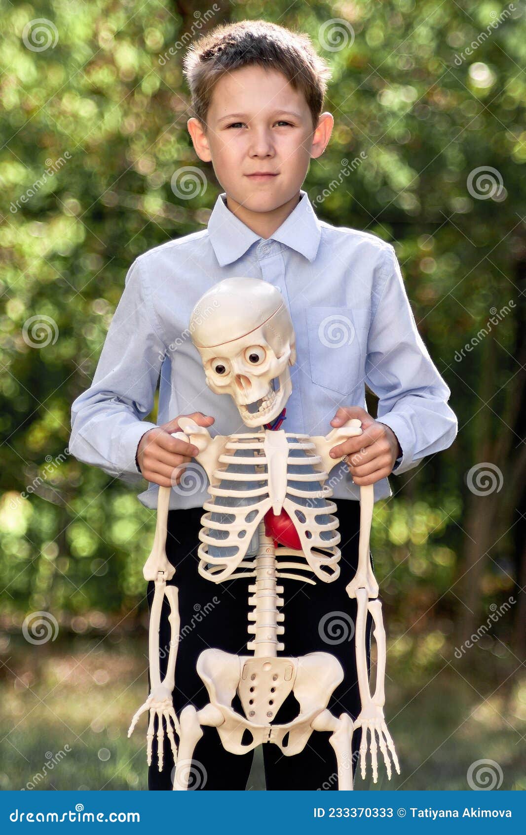 Portrait of a Schoolboy Hugging a Skeleton. the Concept of Studying the ...