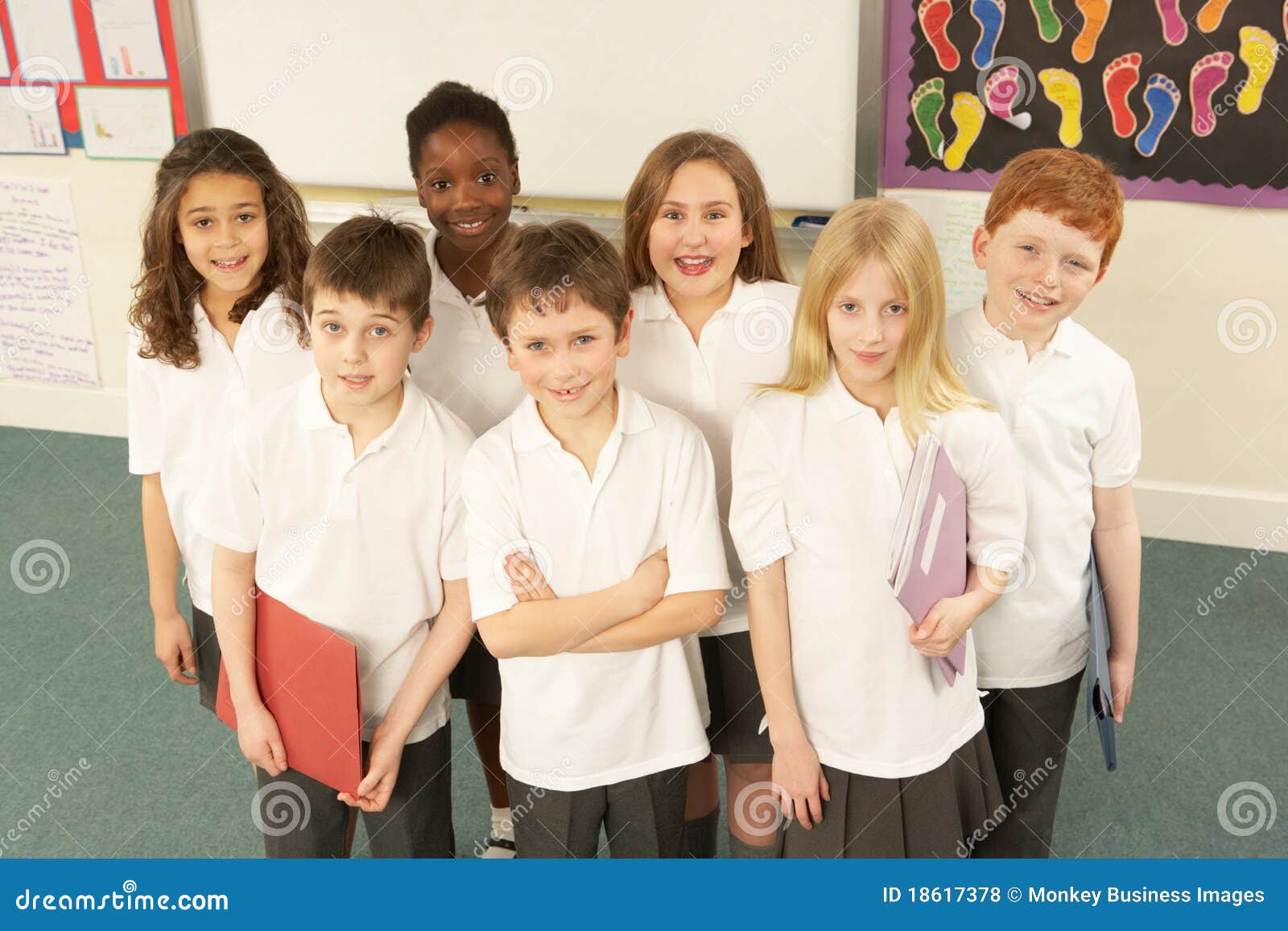 Portrait of Schoolchildren Standing in Classroom Stock Photo - Image of ...
