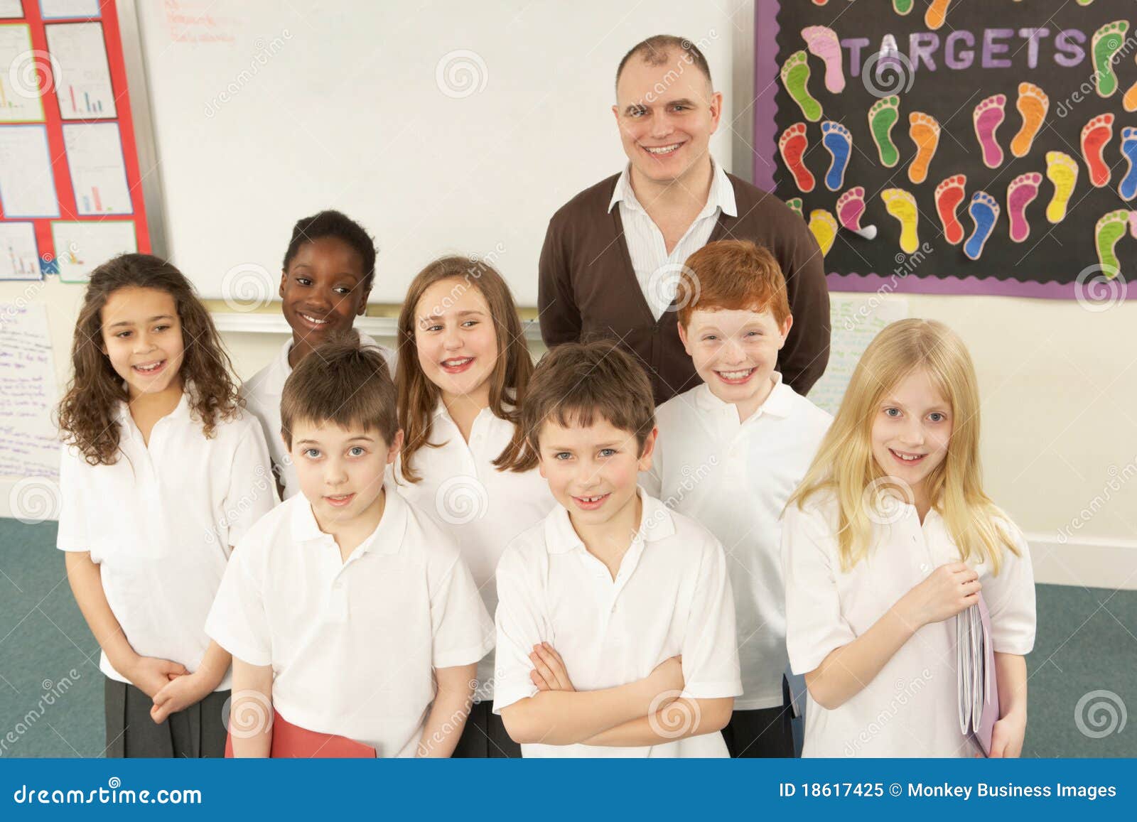 Portrait of Schoolchildren Standing in Classroom Stock Image - Image of ...