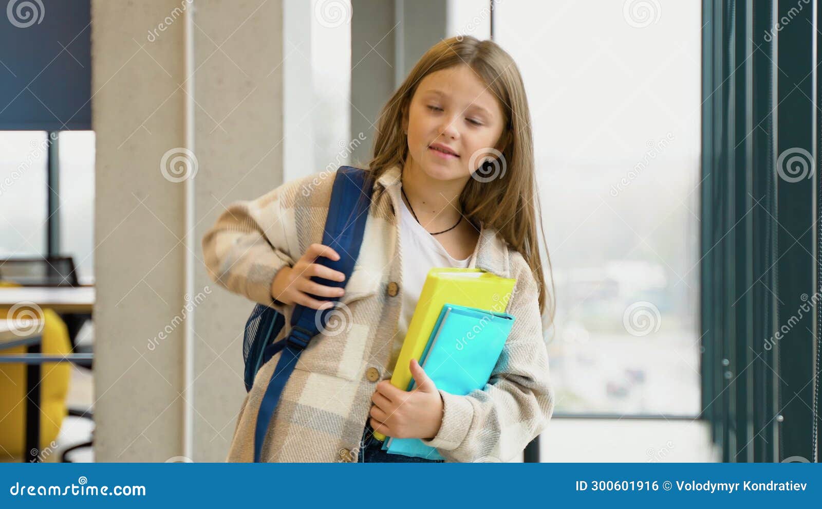 Portrait of Schoolgirl Pupil with a Book in Classroom Stock Footage ... Portrait of Schoolgirl Pupil with a Book in Classroom Stock Footage ...