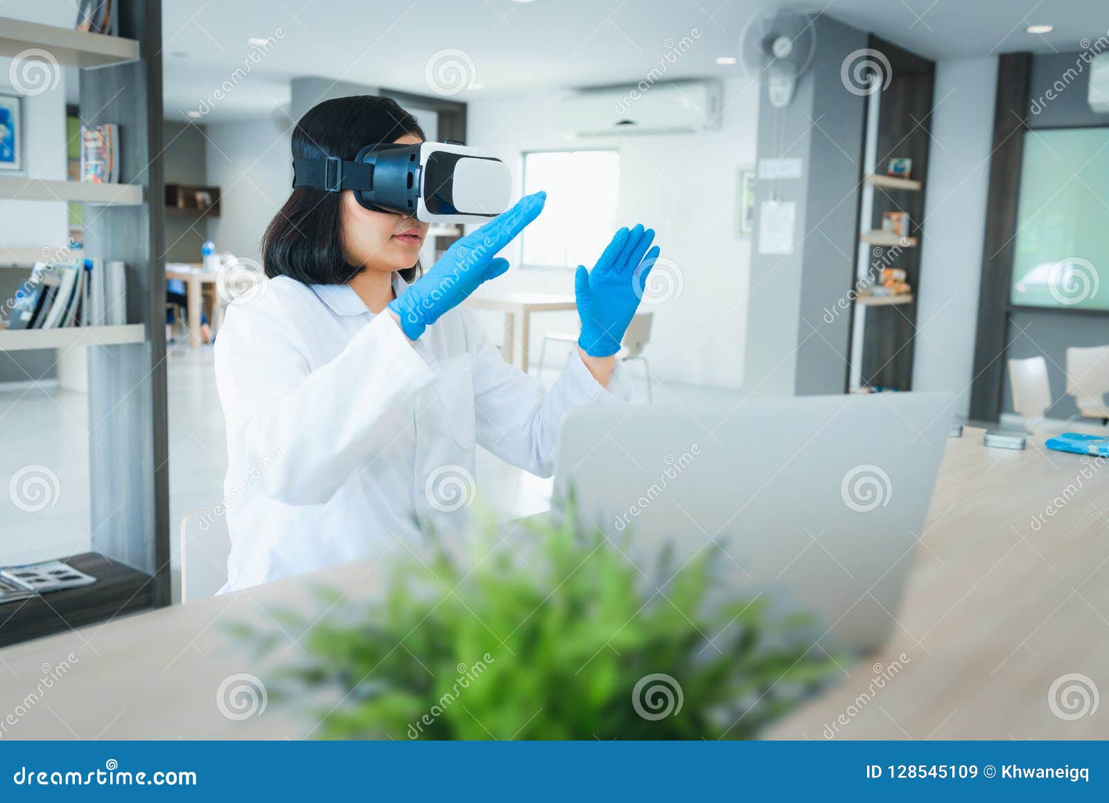 Portrait of Scientist is Using Virtual Reality Technology To ...