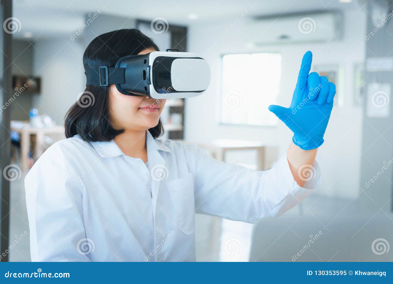 Portrait of Scientist is Using Virtual Reality Technology To ...